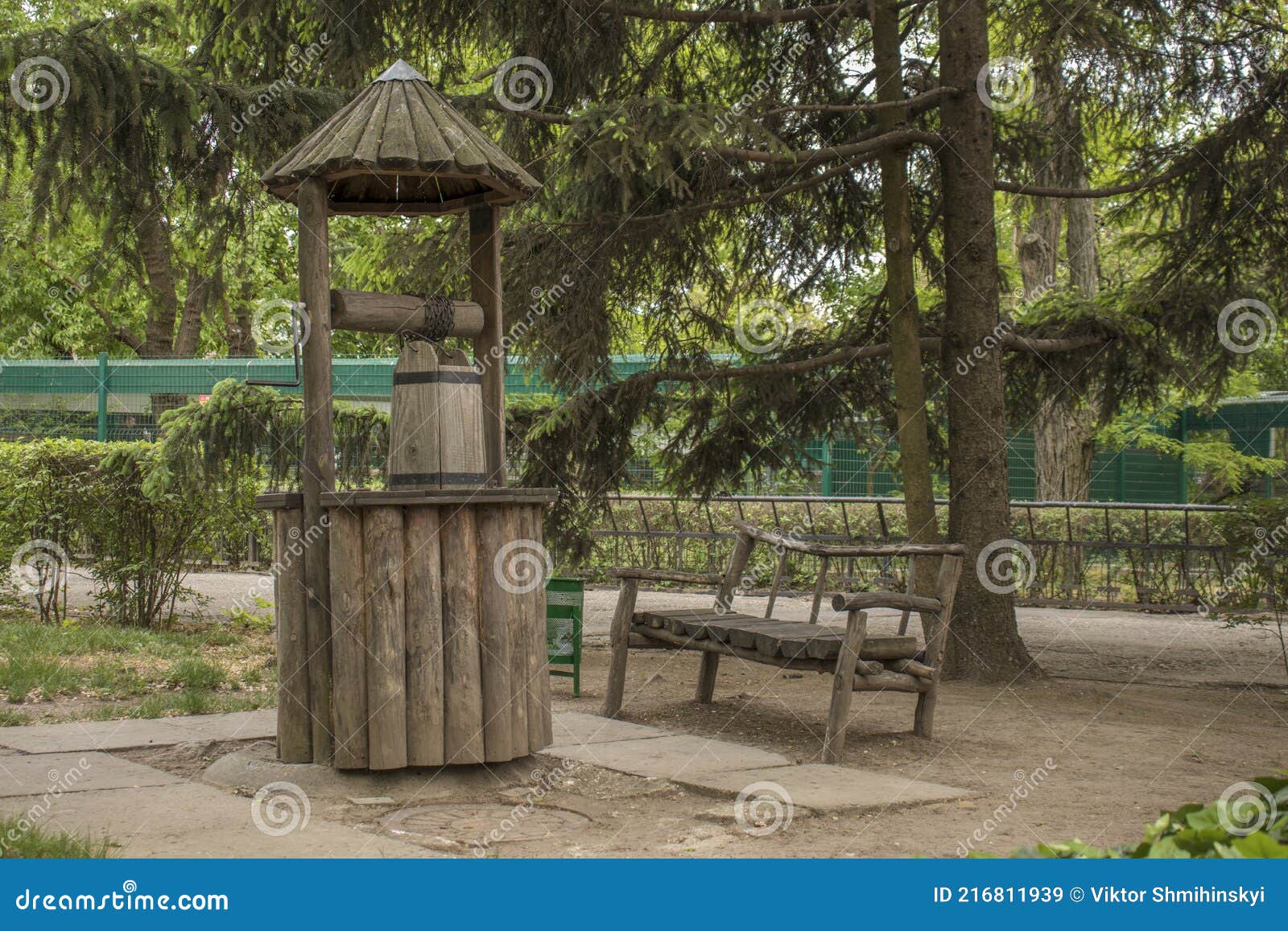 Decorative Wooden Well Standing in the Park. Stock Image - Image of ...