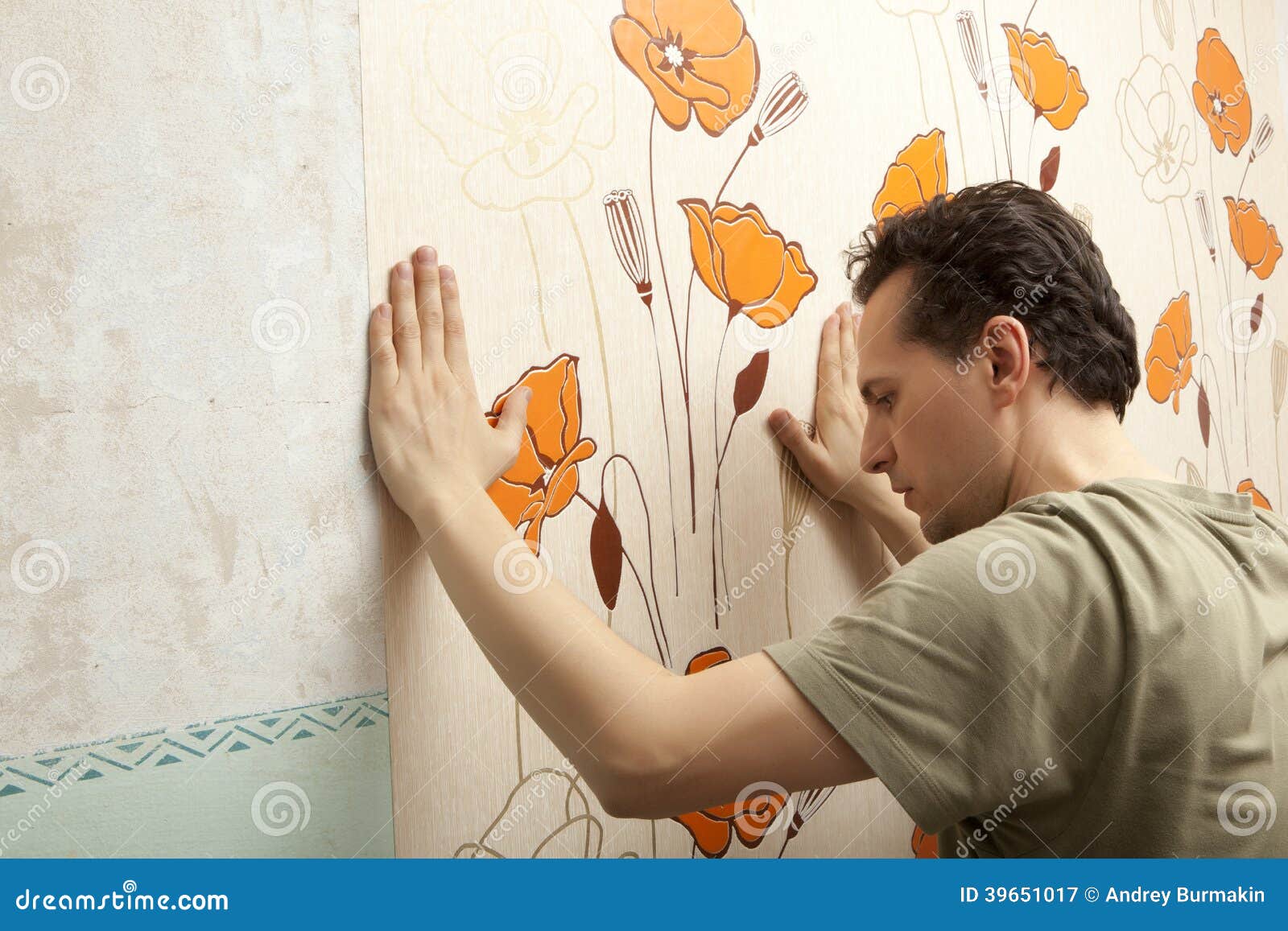 Decorator Hanging Wallpaper Stock Image - Image of paper, interior ...