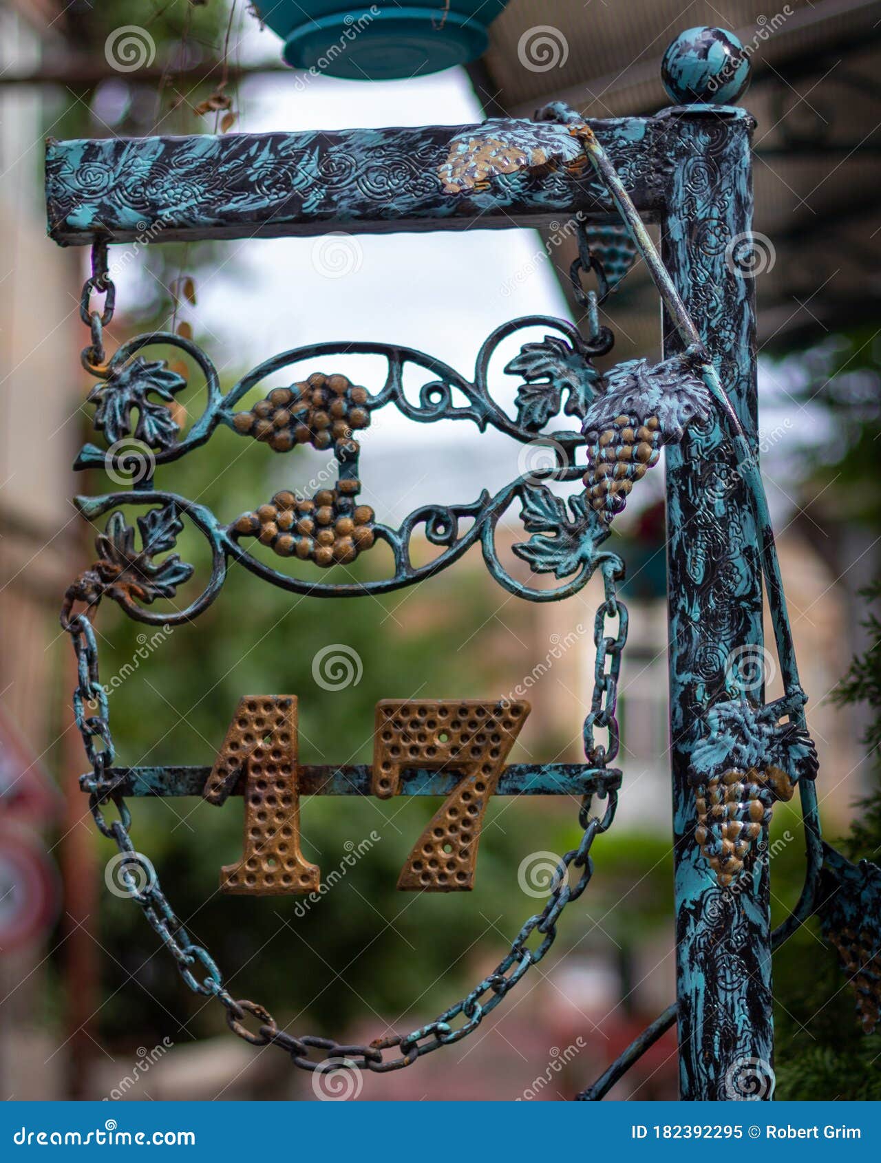 House Number 17 with Grapes and a Chain Stock Image - Image of closeup ...