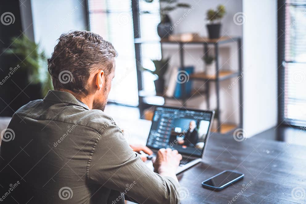 Dedicated Mid-aged Worker in Office Setting, Skilled Programmer, Deeply ...