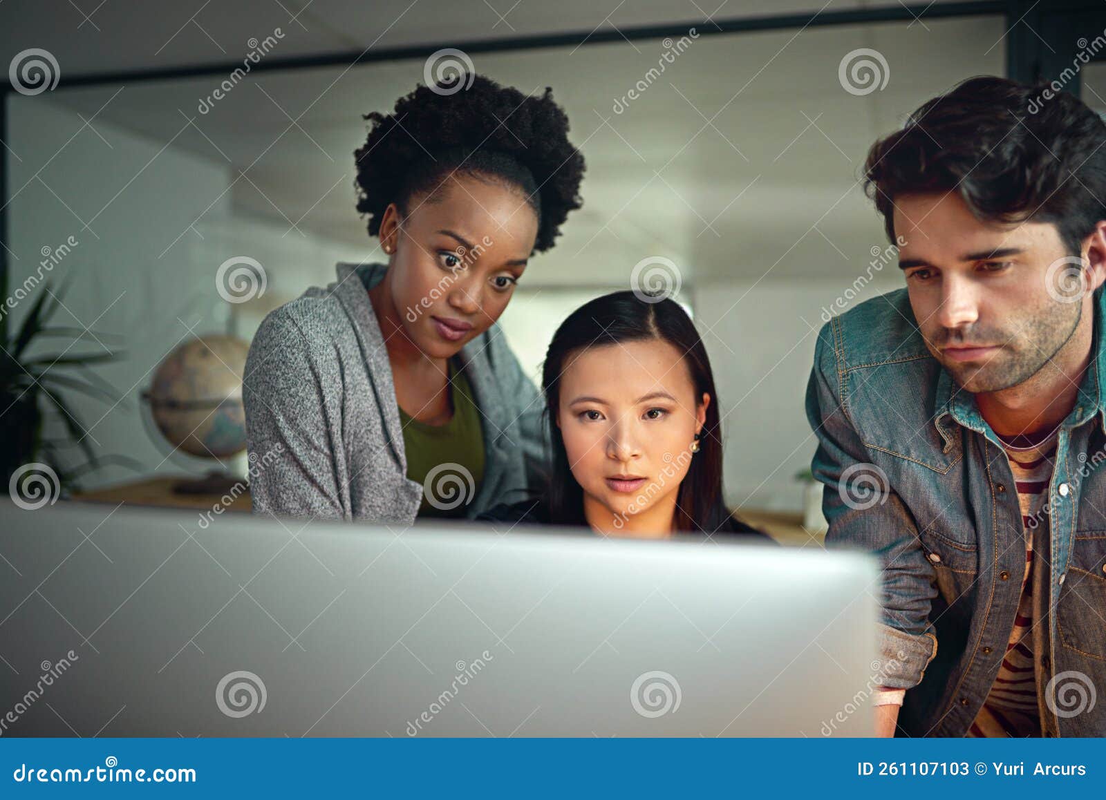 Dedicated To Design. Three Young Designers Working in the Office. Stock Image - Image of ...