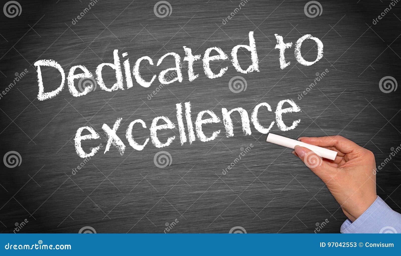 Dedicated To Excellence - Female Hand with Chalk Writing Text Stock ...