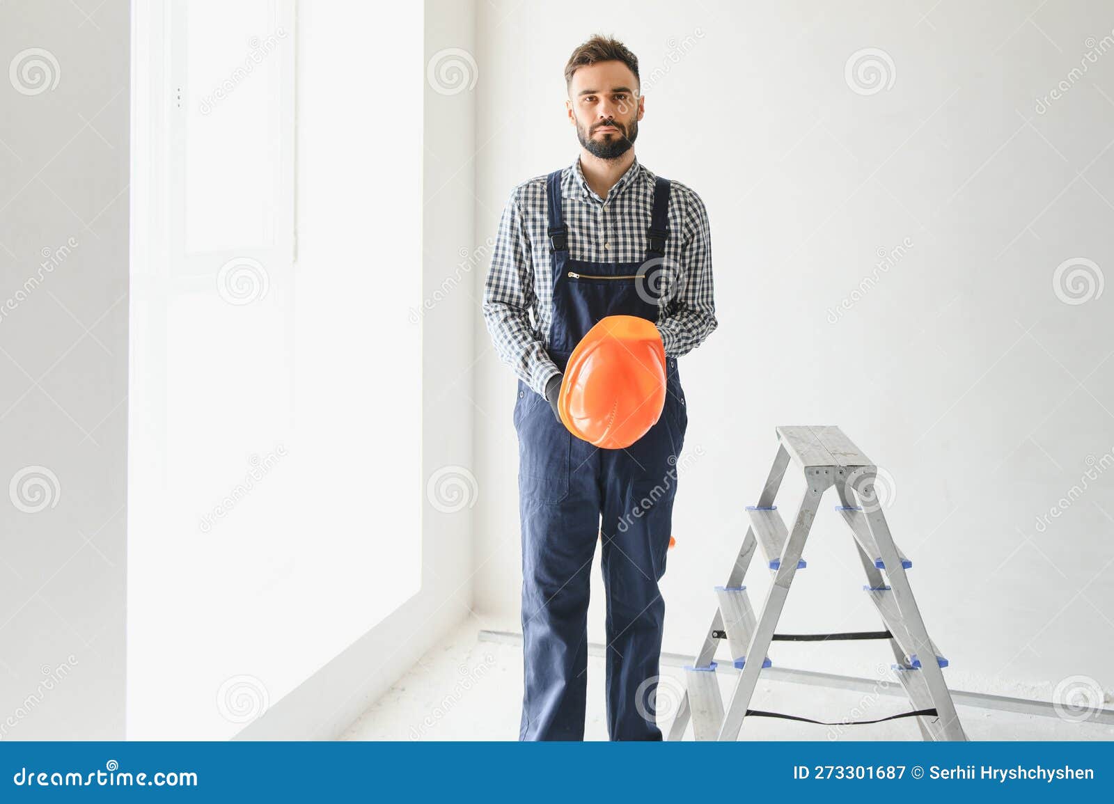 A Dedicated Worker Doing Calculations for Material for Apartment in ...