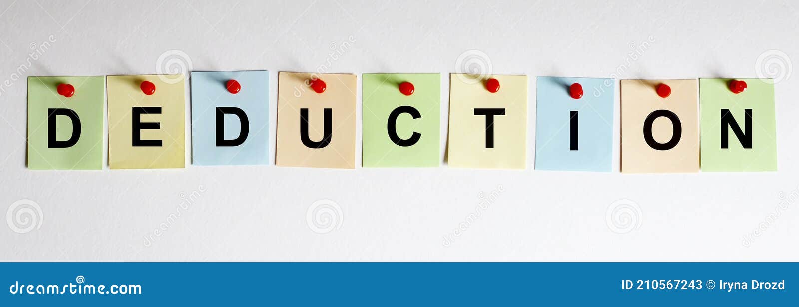 DEDUCTION Phrase is Written on Multi-colored Stickers, on the White ...