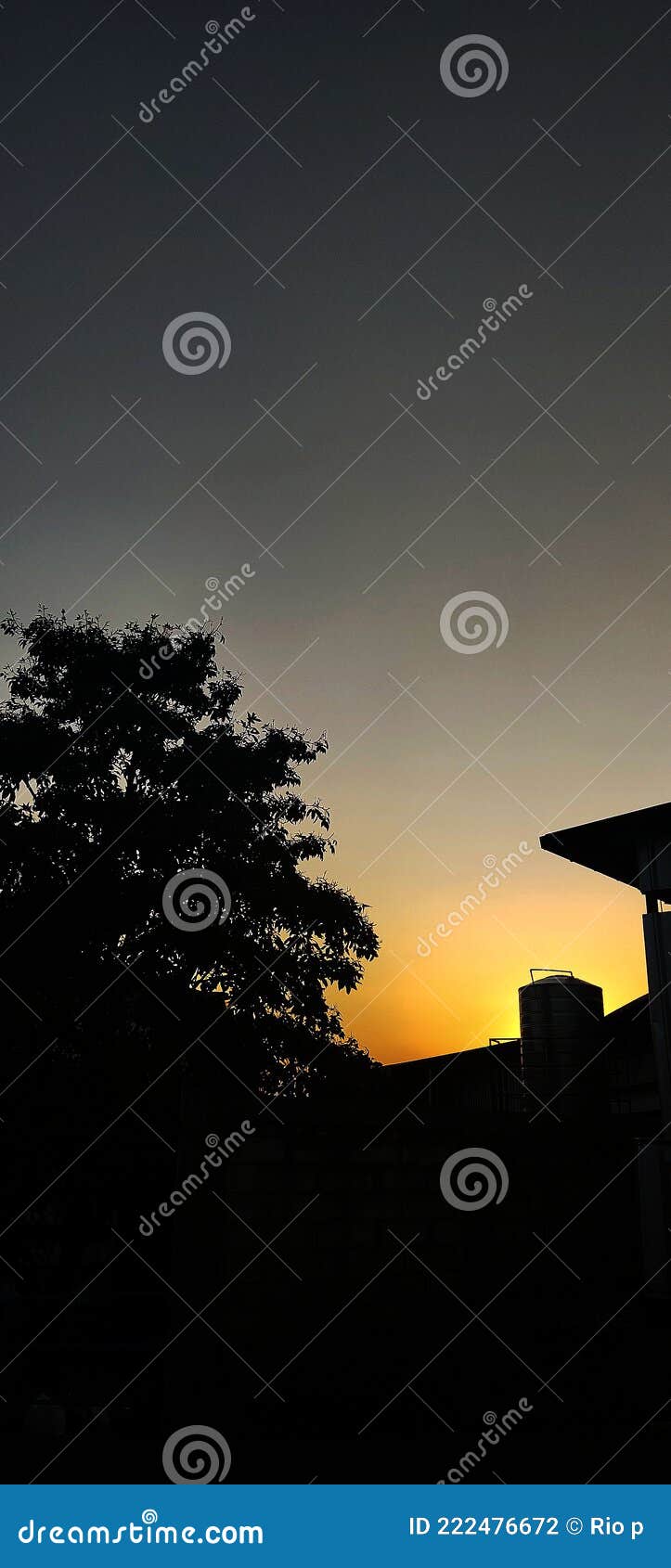 The Deep Atmosphere of the Sunset Behind the Water Reservoir Stock ...