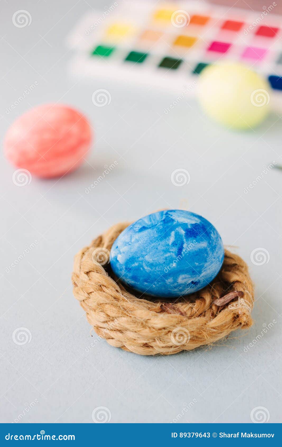 Deep Blue Easter Egg on Nest Over Bright Background. Stock Image ...