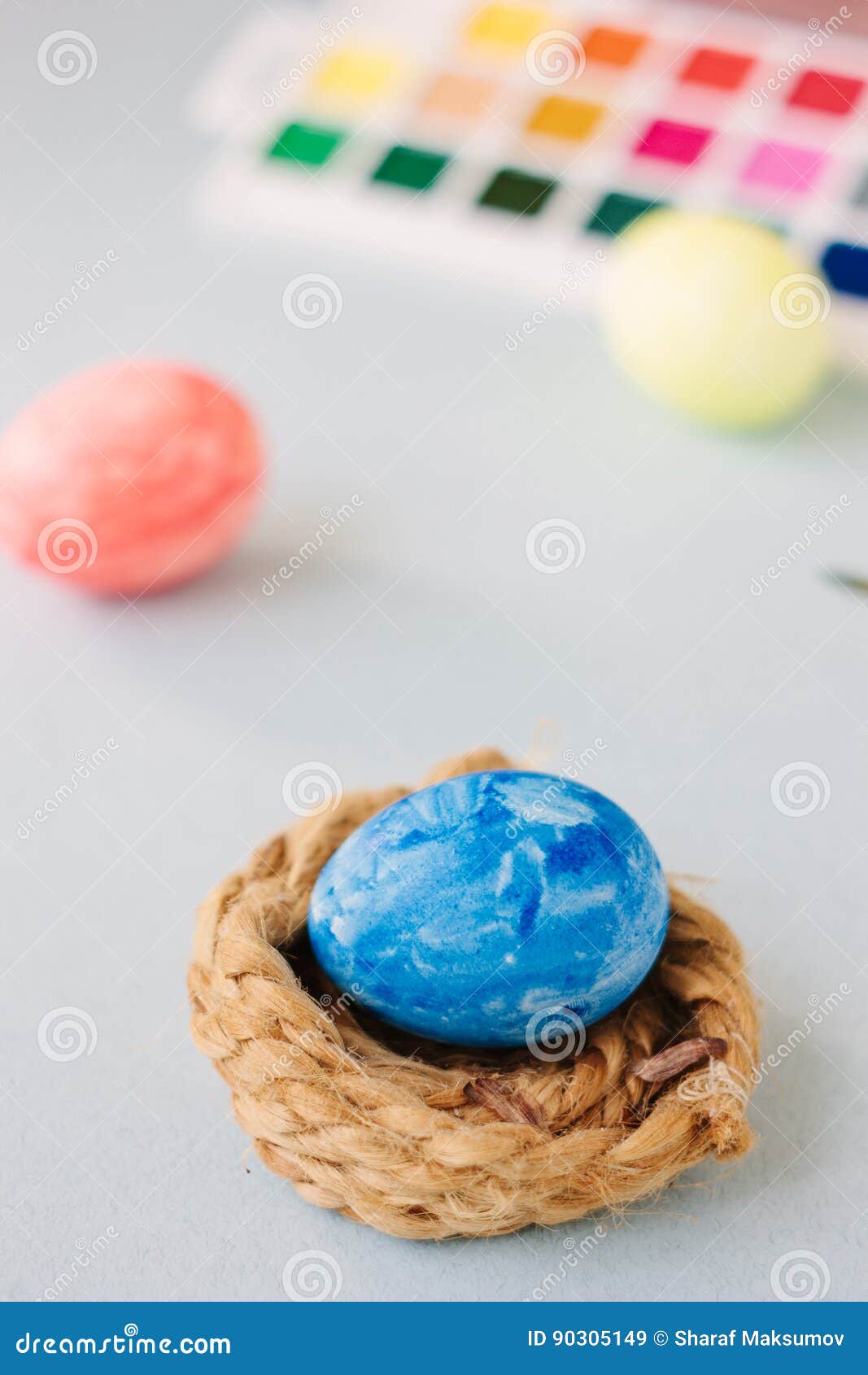 Deep Blue Easter Egg on Nest Over Bright Background. Stock Image ...
