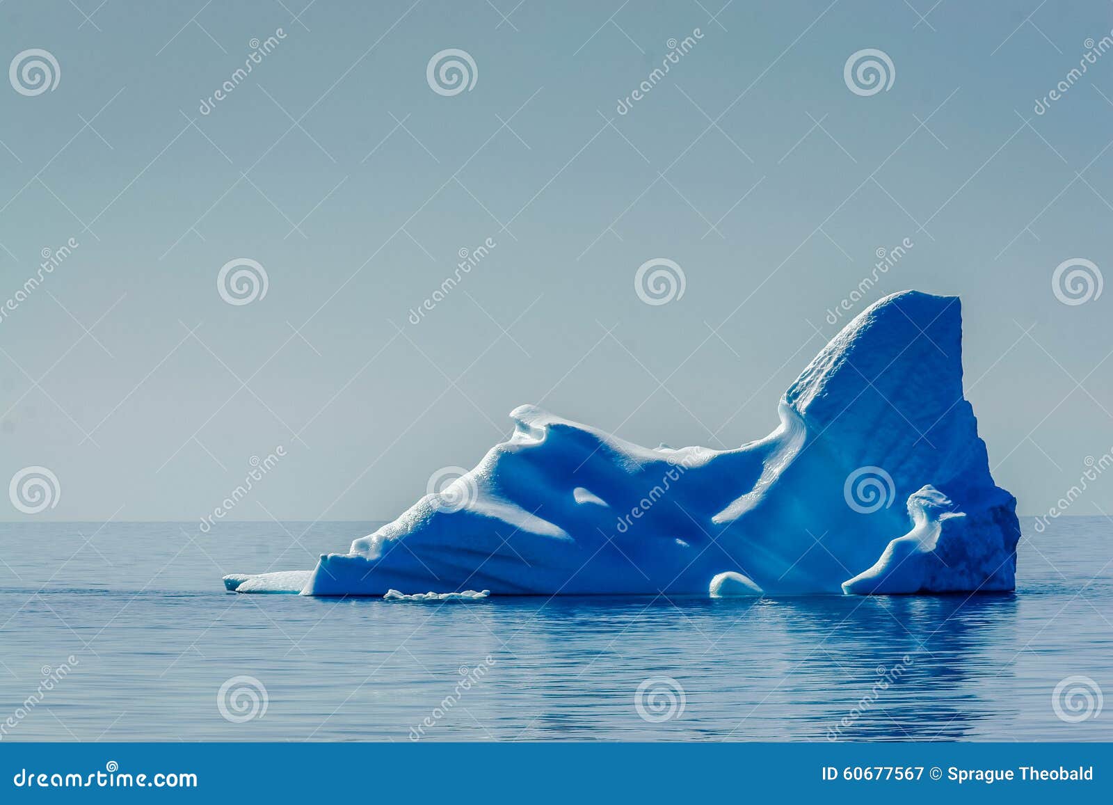Deep Blue Iceberg Floats in the Arctic Sae, Melting Stock Image - Image ...