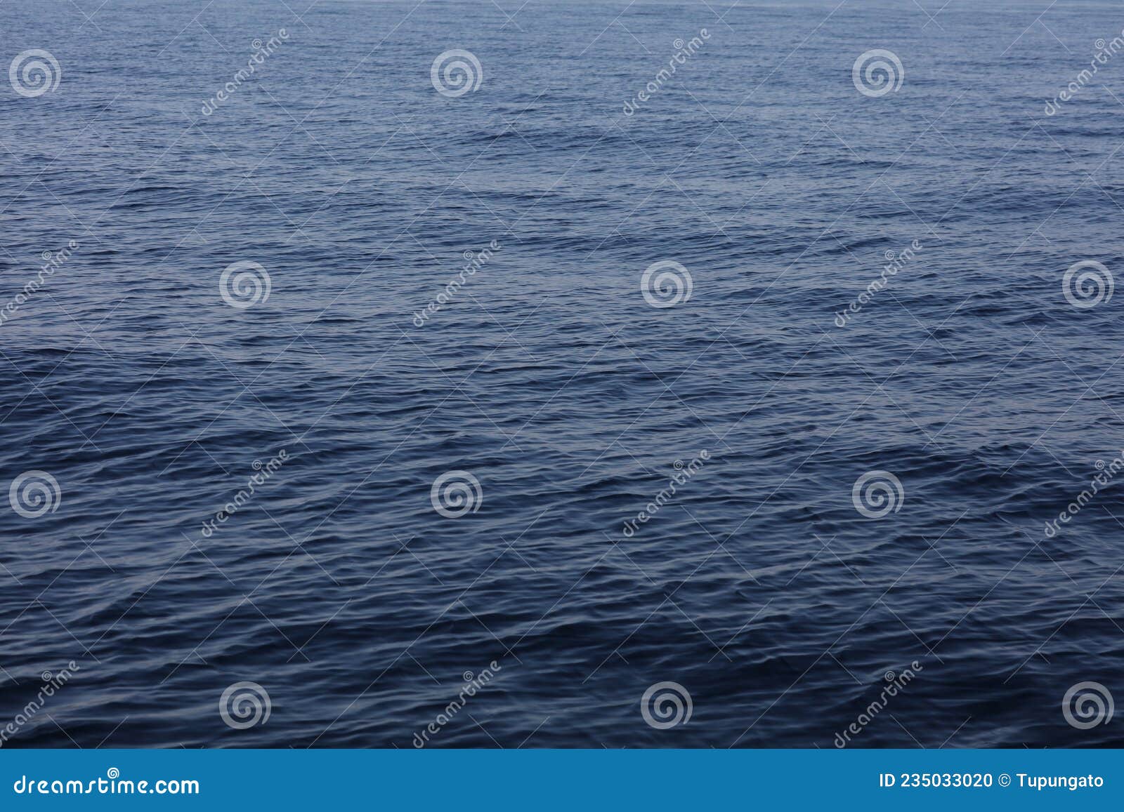 Deep blue ocean surface stock photo. Image of maritime - 235033020