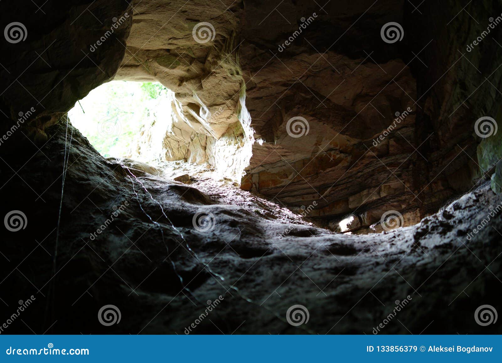Deep Cold Cave. Reach the Exit Stock Image - Image of reach, nature ...