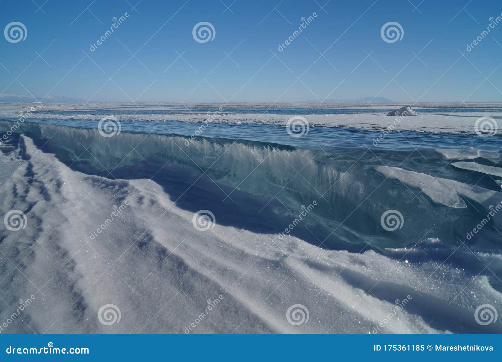 A Deep Crack in the Shiny Smooth Surface of the Ice Stock Image - Image ...