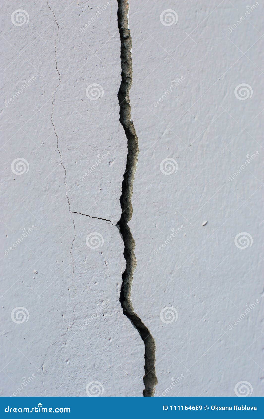Deep crack on a white wall stock image. Image of crack - 111164689