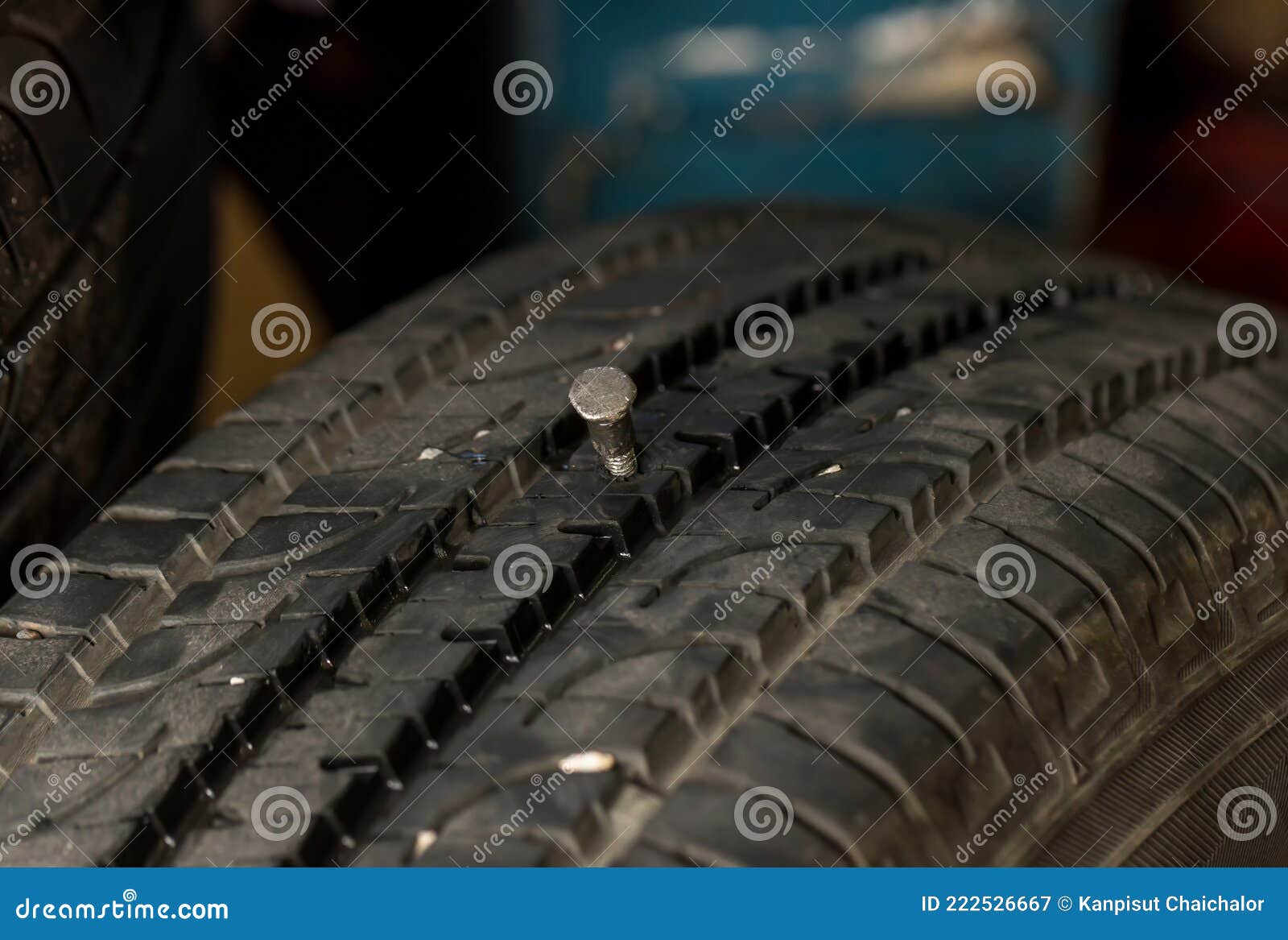 Deep Embedded of Nail on the Tire. Puncturing Tire. Tire Tread Nail ...