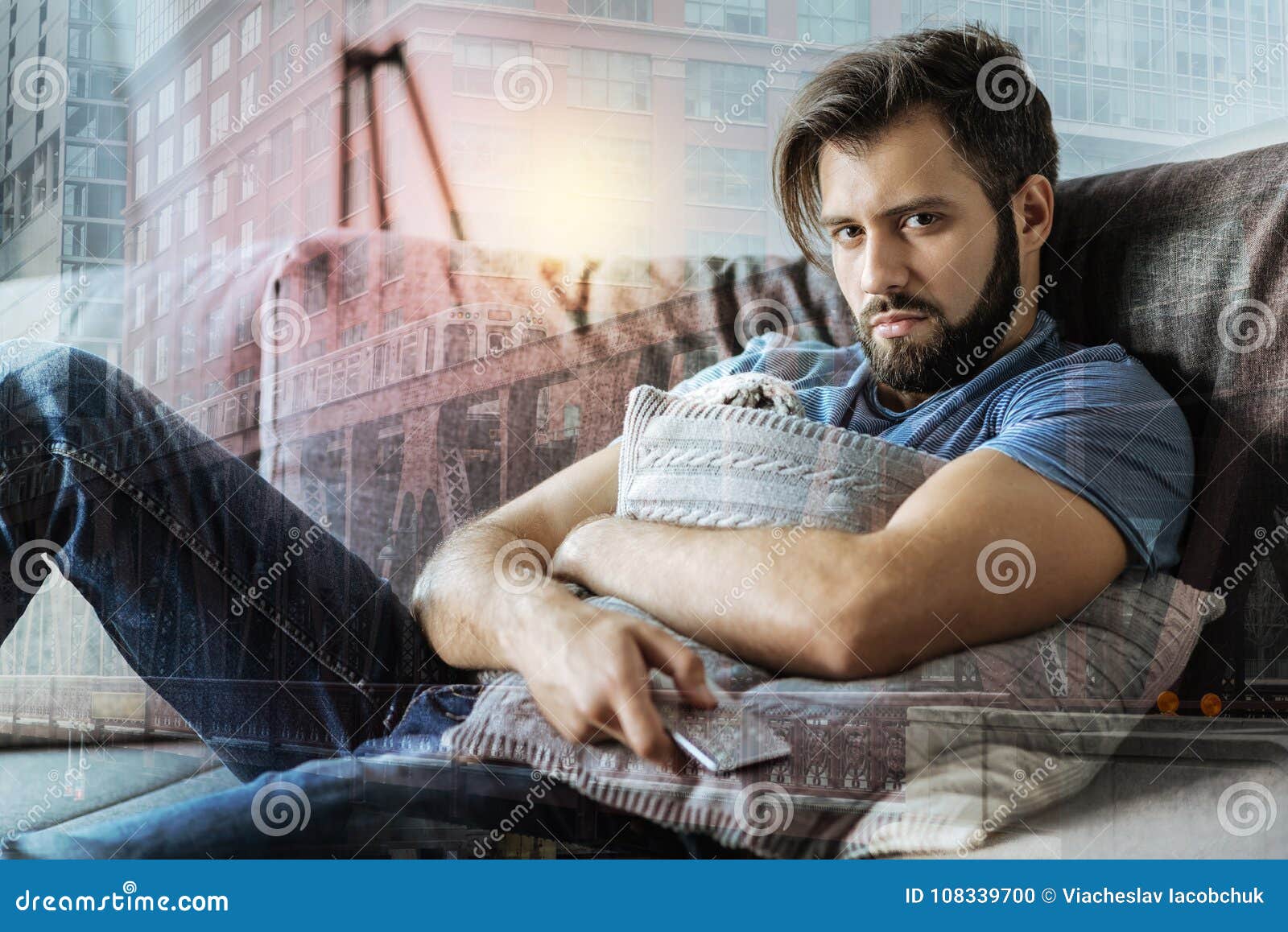 Deep Exhausted Man Hugging the Pillow and Looking Straight. Stock Photo ...