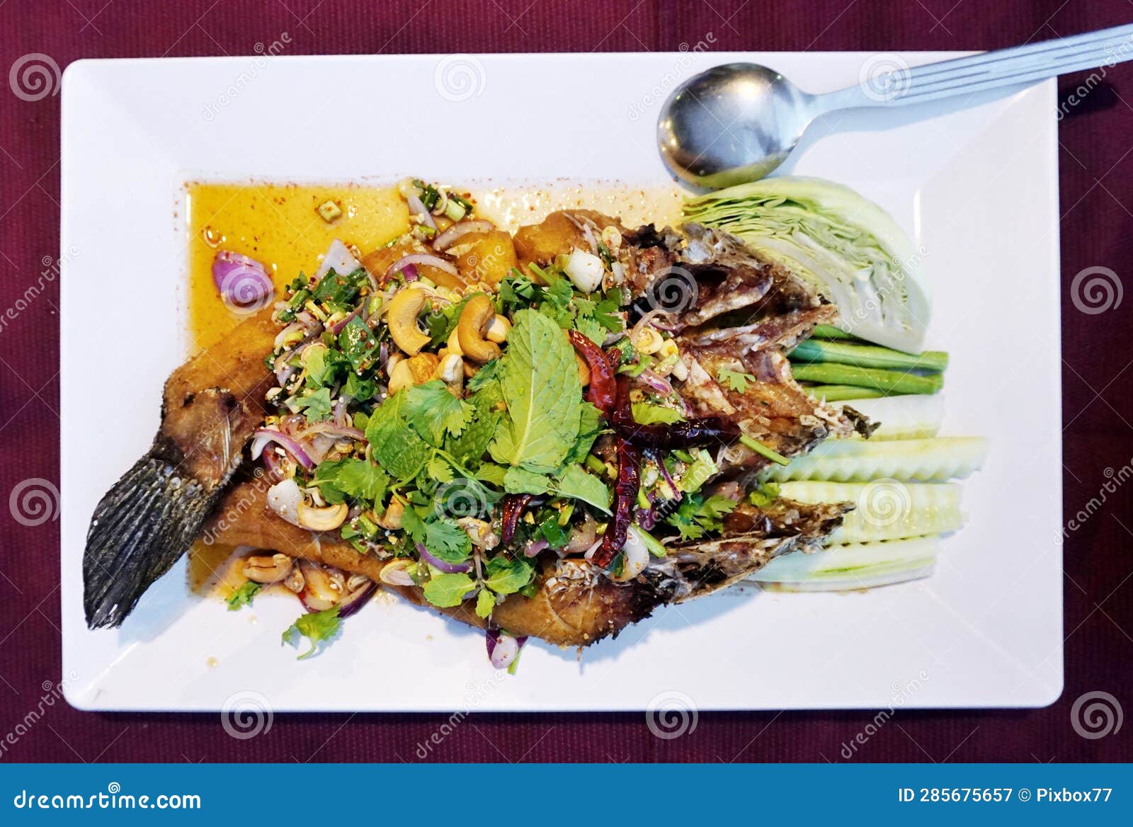 Deep Fired Fish Dressed with Spicy Thai Herbs Salad Stock Image - Image ...
