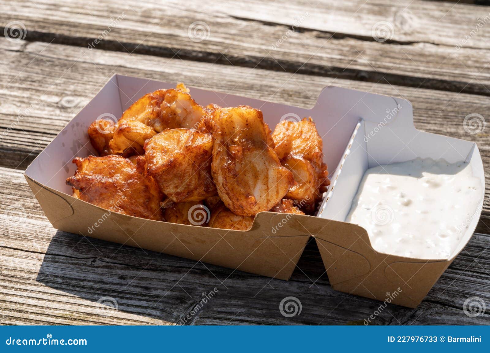 Deep Fried Cod Fish in Pieces Served Outdoor with Tartar Sauce Stock ...