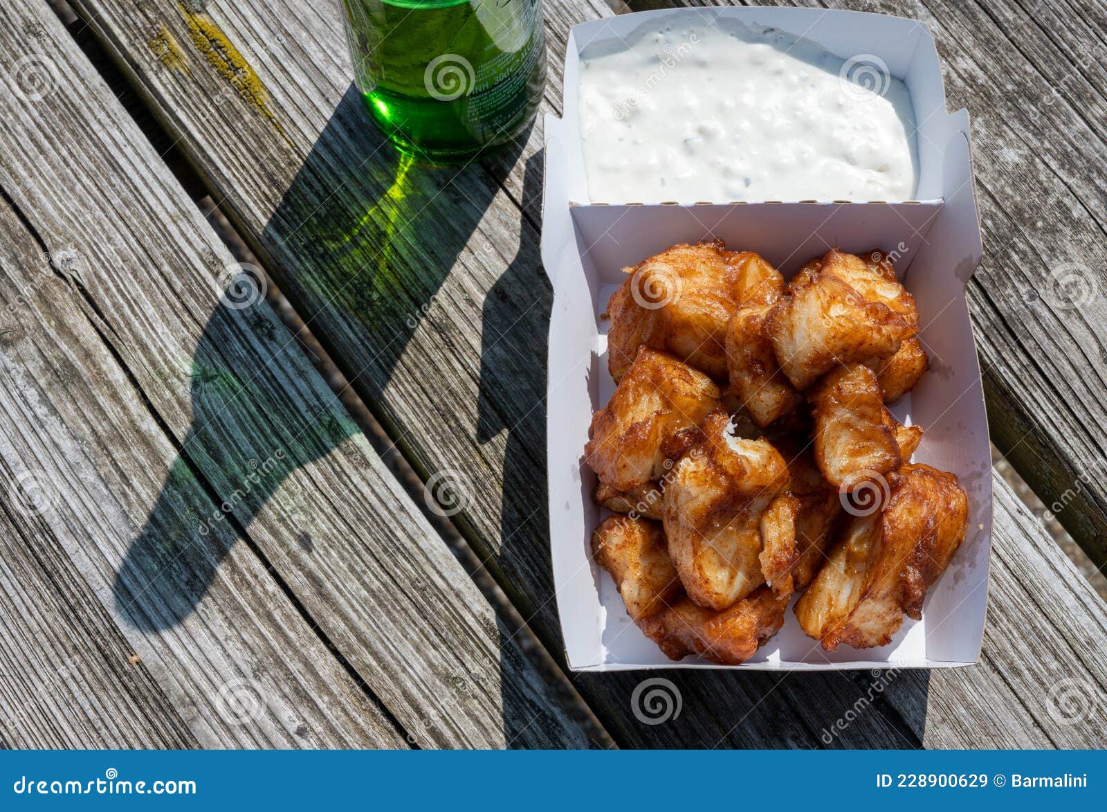 Deep Fried Cod Fish in Pieces Served Outdoor with Tartar Sauce Stock ...