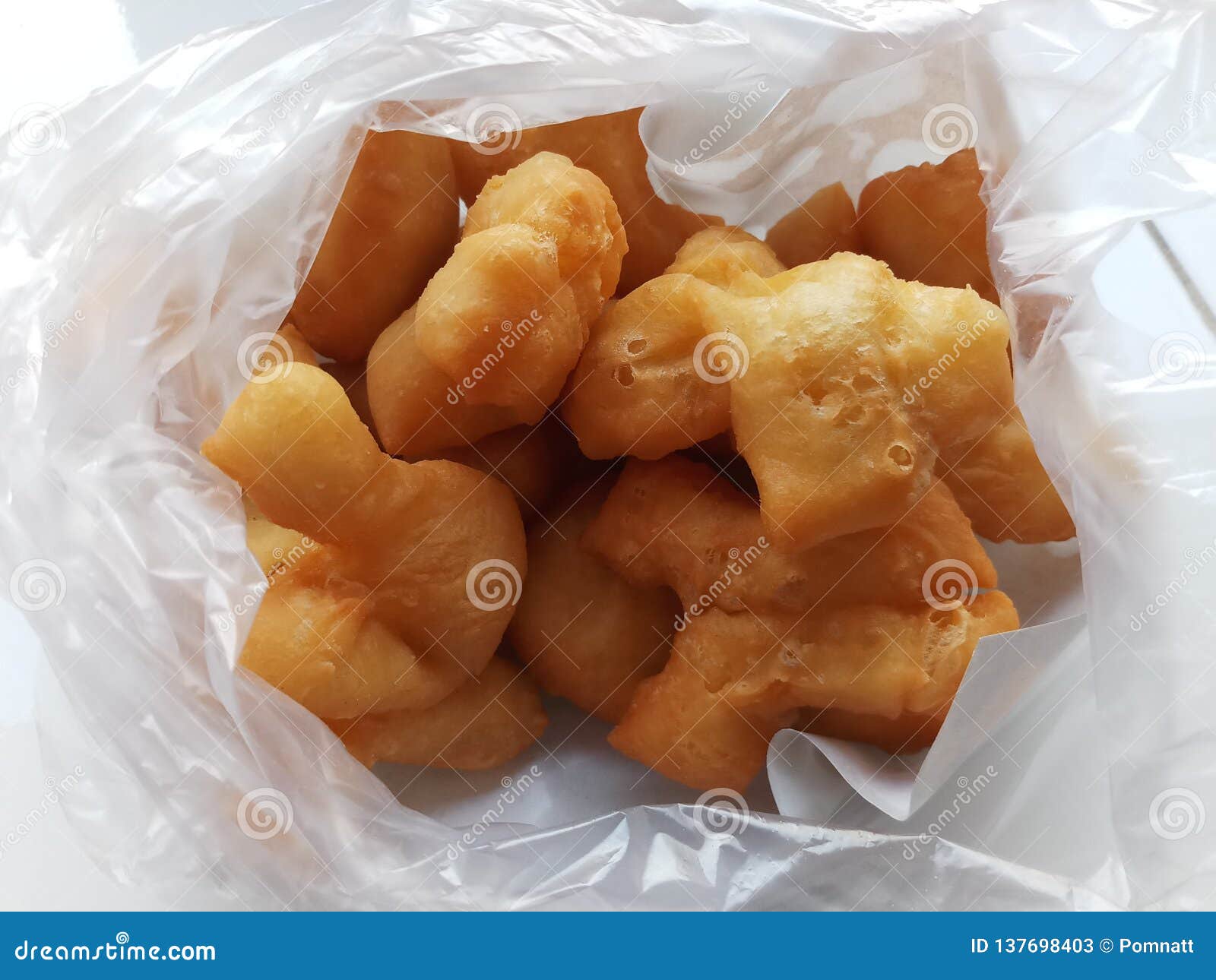 Deep-fried Dough Stick in Plastic Bag Stock Image - Image of oily ...