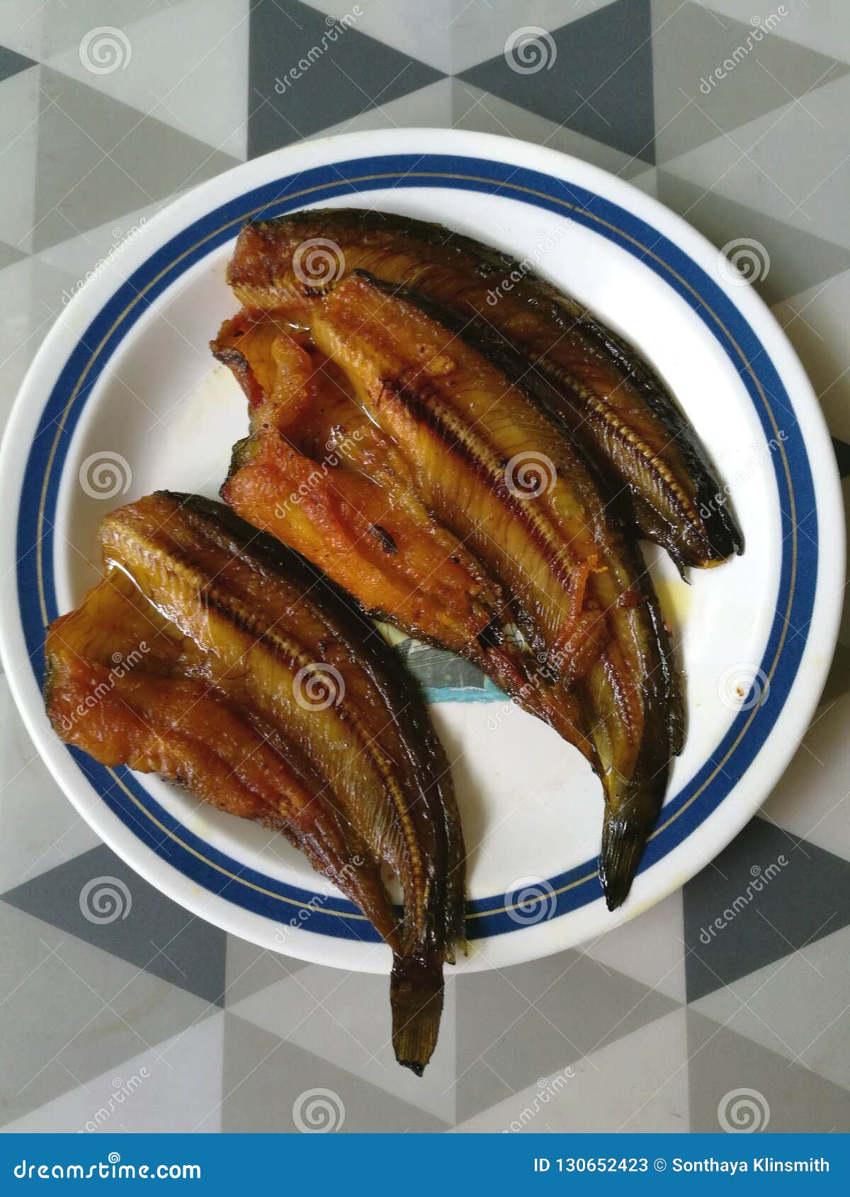 Dried Catfish Fillet On Wooden Background. Snack For Beer Dried Smelts ...