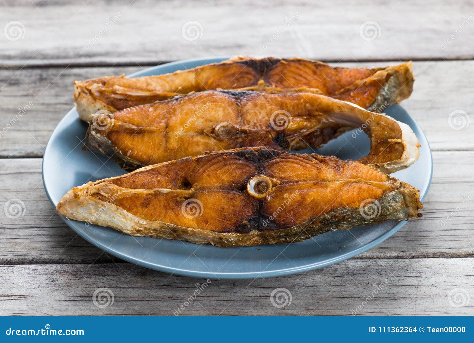 Deep Fried Fish on Wooden Table Stock Photo - Image of healthy, plate ...