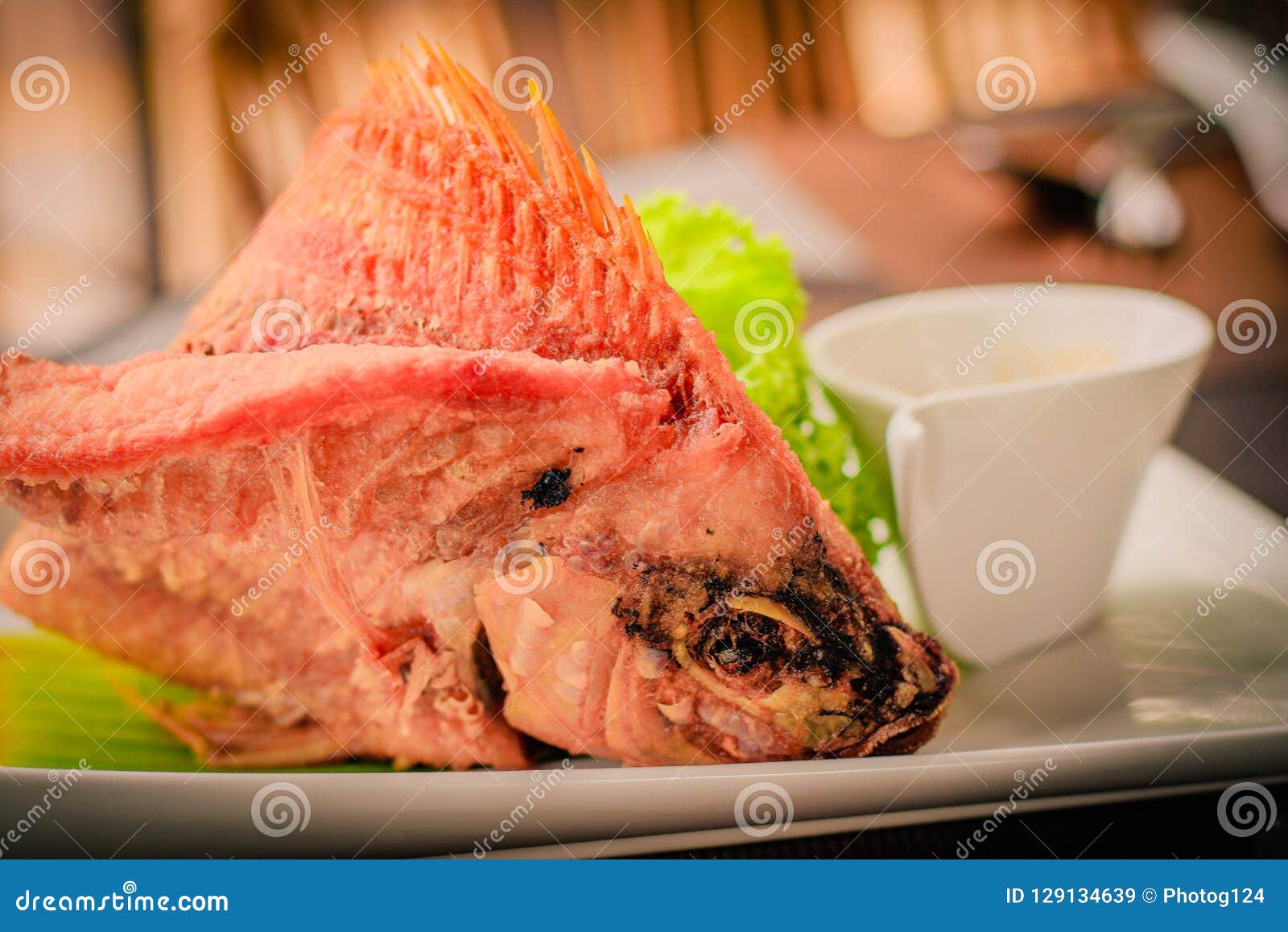 Deep-fried Flying Fish Served with Sweet-and-spicy Dark Sauce Stock ...