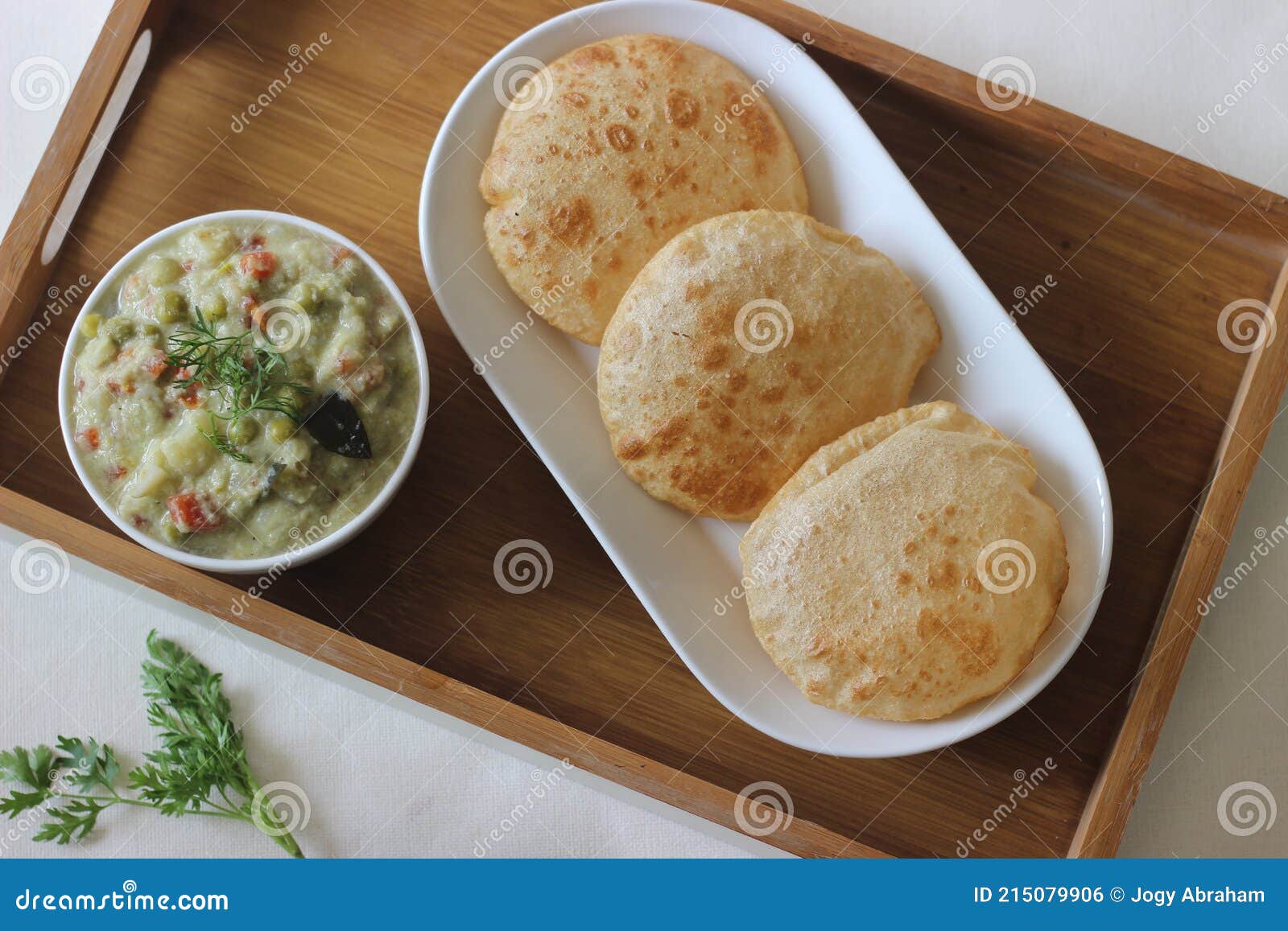 Deep Fried Indian Flat Bread Served with Mixed Vegetable Curry in a ...