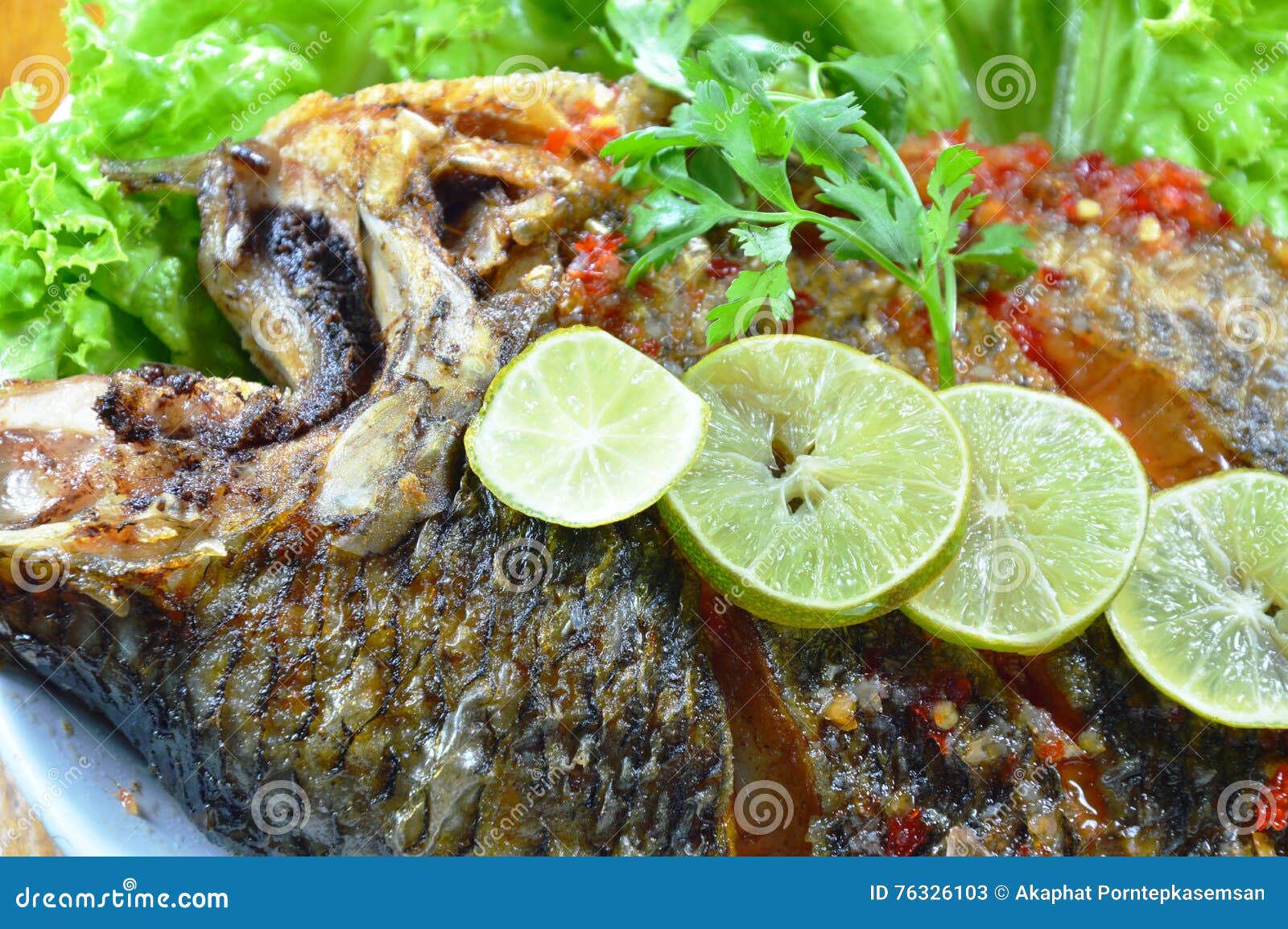 Deep Fried Mango Fish Dressing Sweet Chili Sauce and Slice Lemon Stock ...