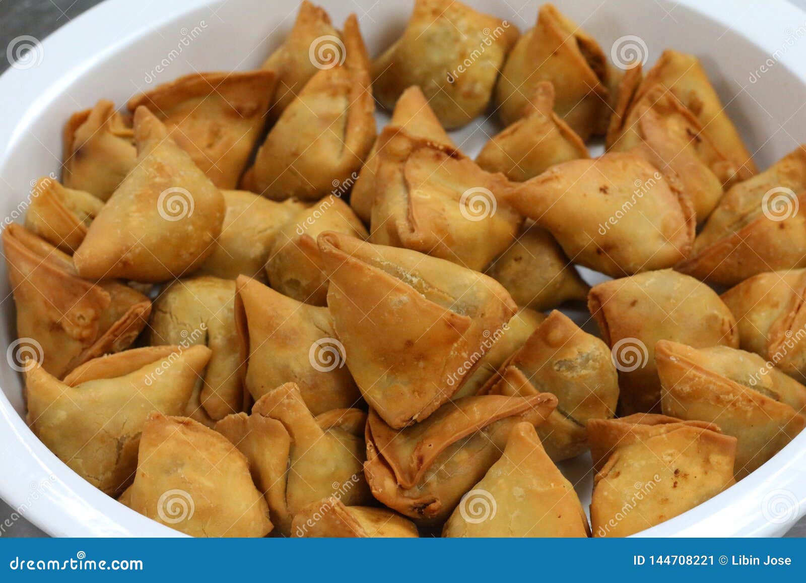 Deep fried Punjabi samosa stock image. Image of ceramic - 144708221