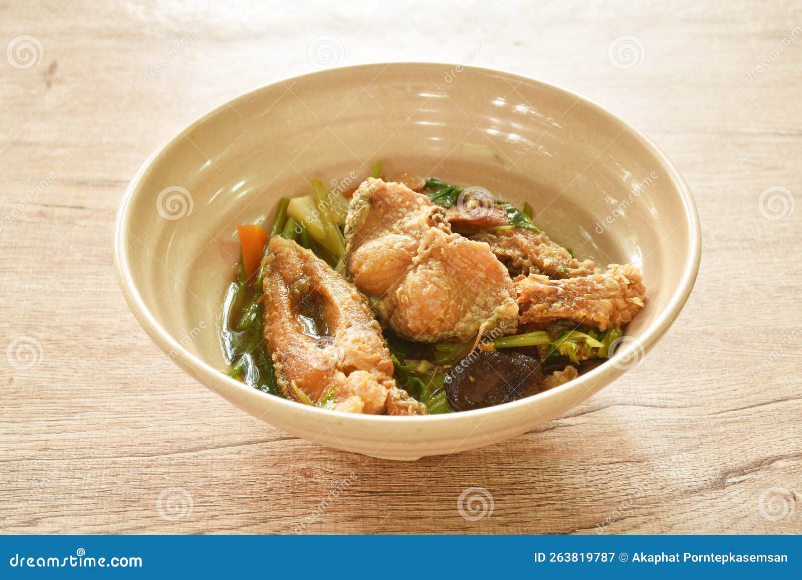 Deep Fried Slice Striped Snake Head Fish with Ginger and Celery on Bowl ...