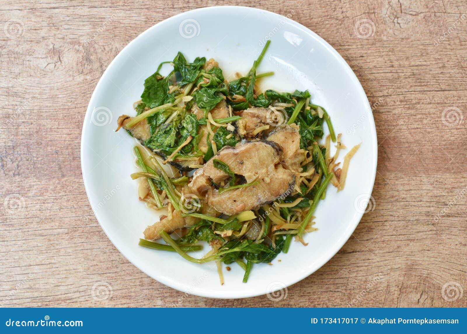 Deep Fried Slice Striped Snake Head Fish with Ginger and Celery on Dish ...