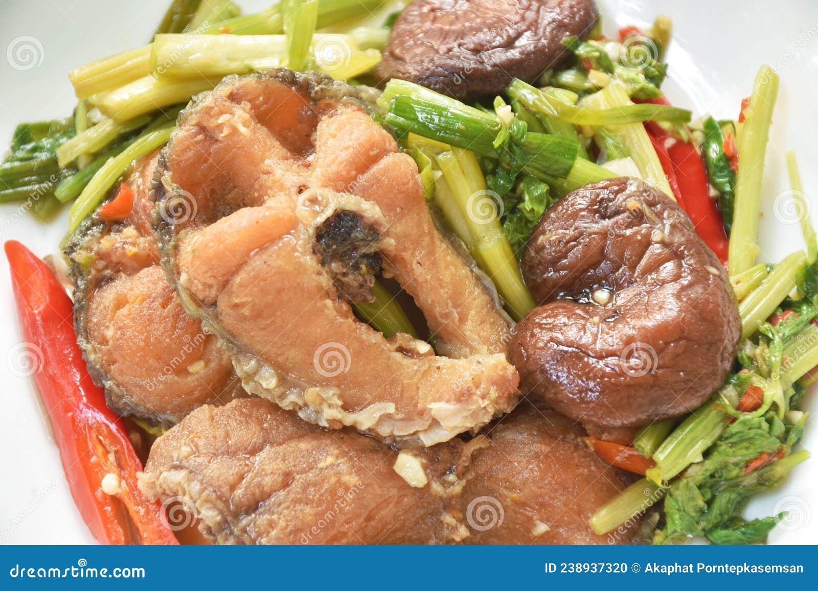 Deep Fried Slice Striped Snake Head Fish with Ginger and Celery on ...