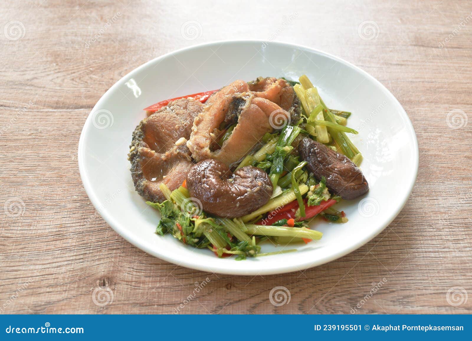 Deep Fried Slice Striped Snake Head Fish with Ginger and Celery on ...