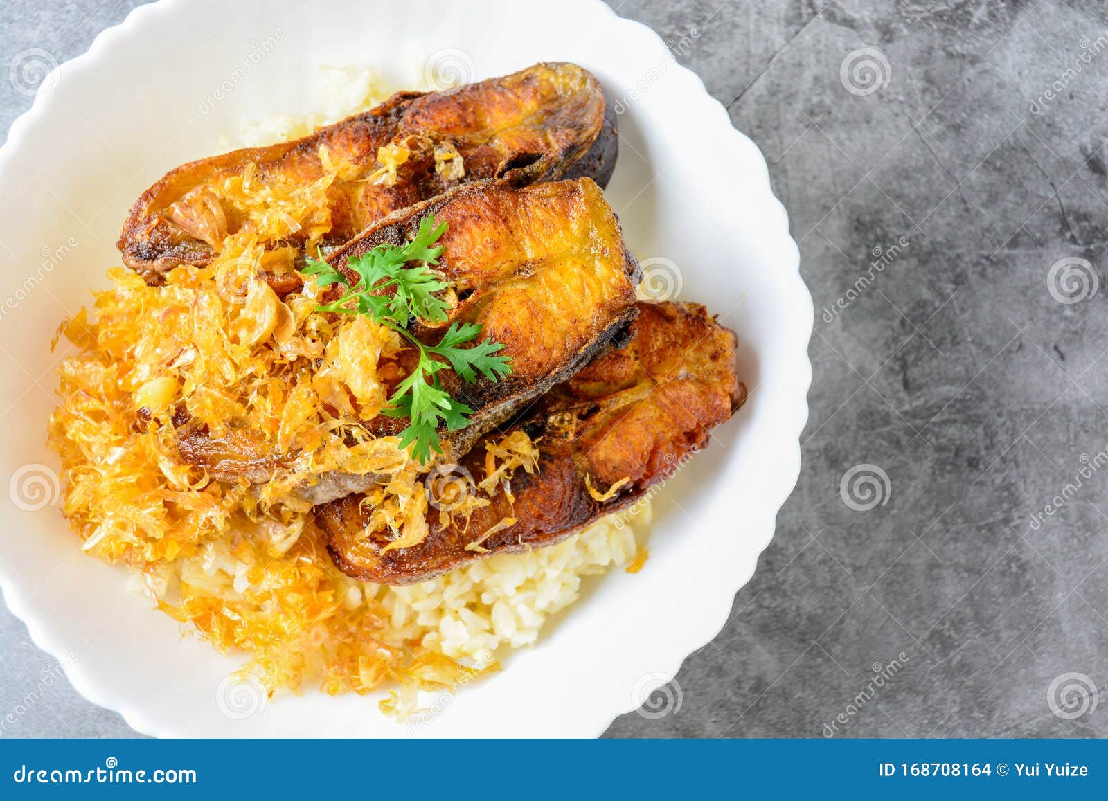 Deep Fried Sliced Pangasius Fish with Garlic, Served with Brown Rice ...
