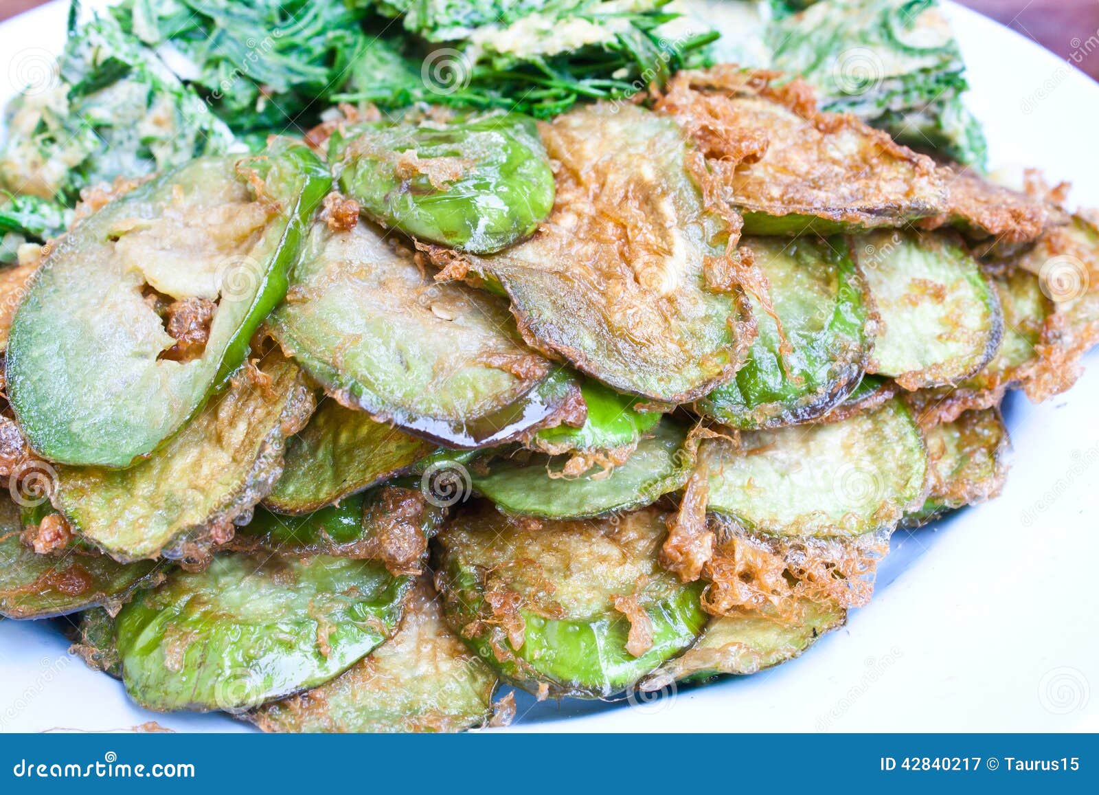 Fried Snake Head Fish And Egg Stuffed Climbing Wattle In Spicy Sour ...