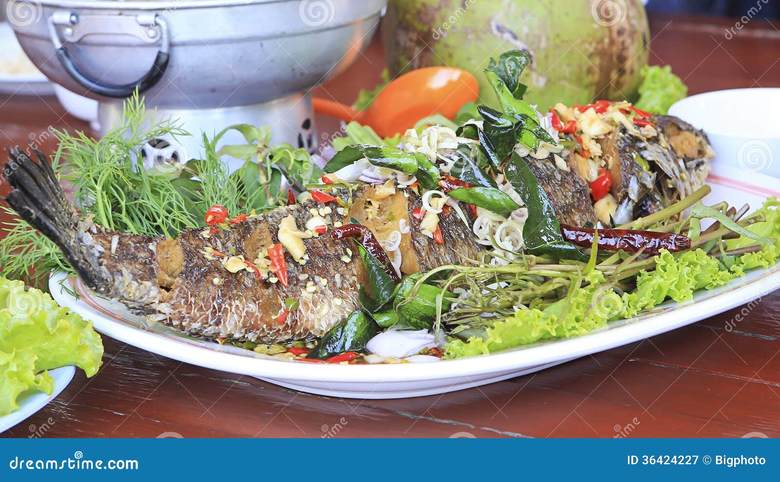 Deep Fried Snakehead Fish with Herb Stock Image - Image of green, salad ...