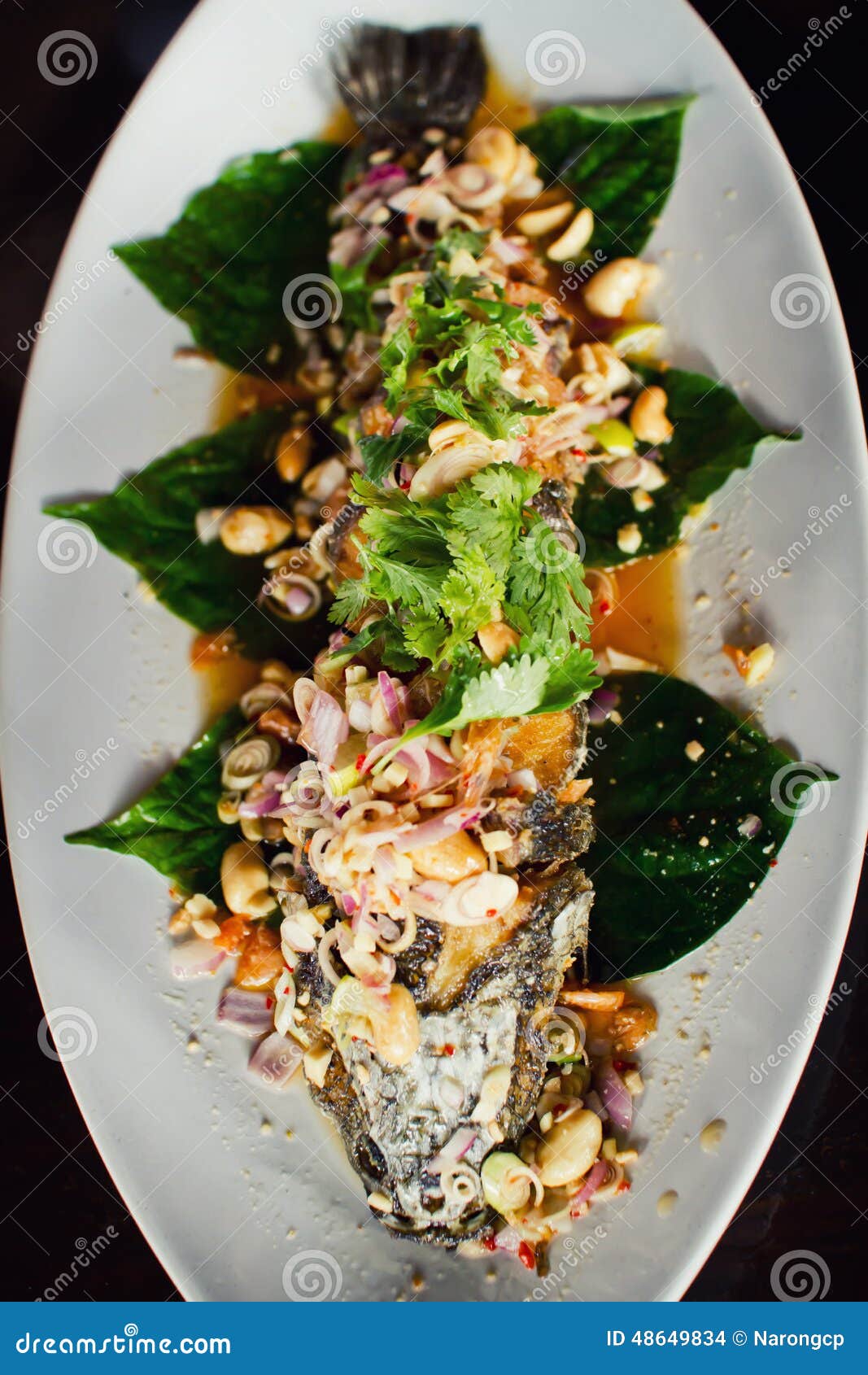 Deep Fried Snakehead Fish stock photo. Image of green - 48649834