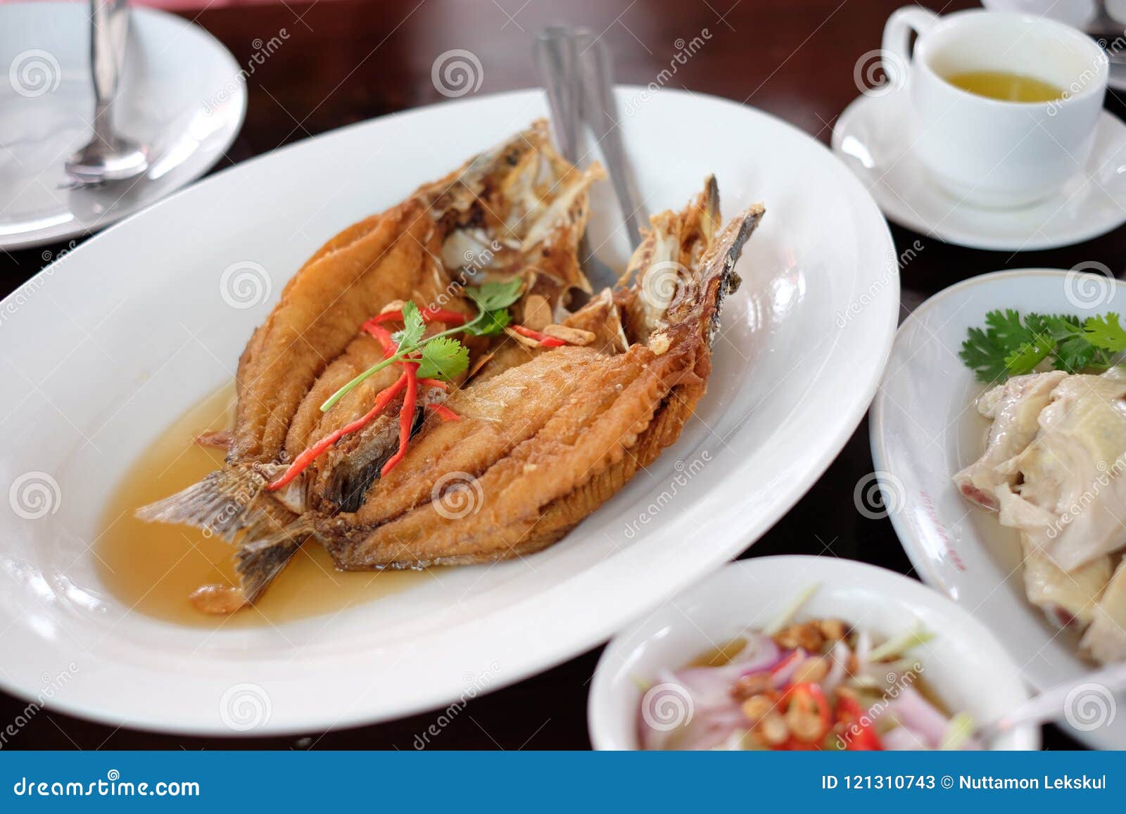 Deep Fried Snapper Topped with Fish Sauce. Stock Image - Image of fried ...