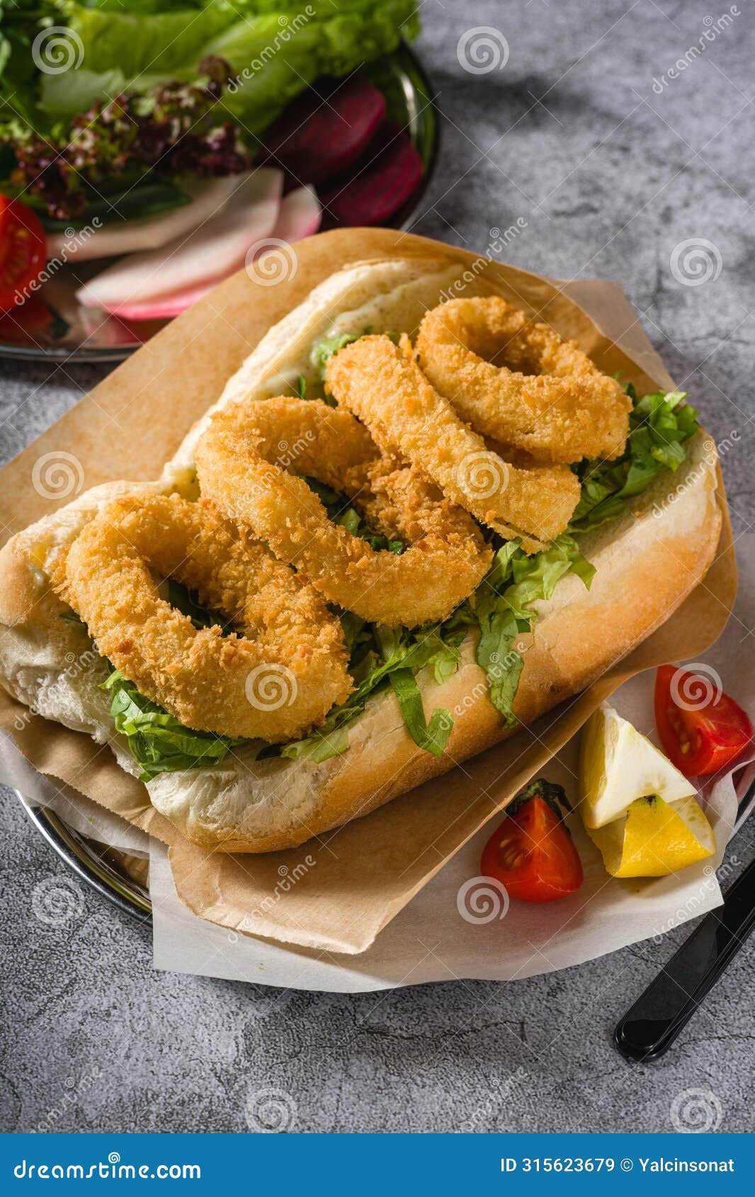 Deep Fried Squid in Bread with Greens on the Side. Squid Sandwich Stock ...