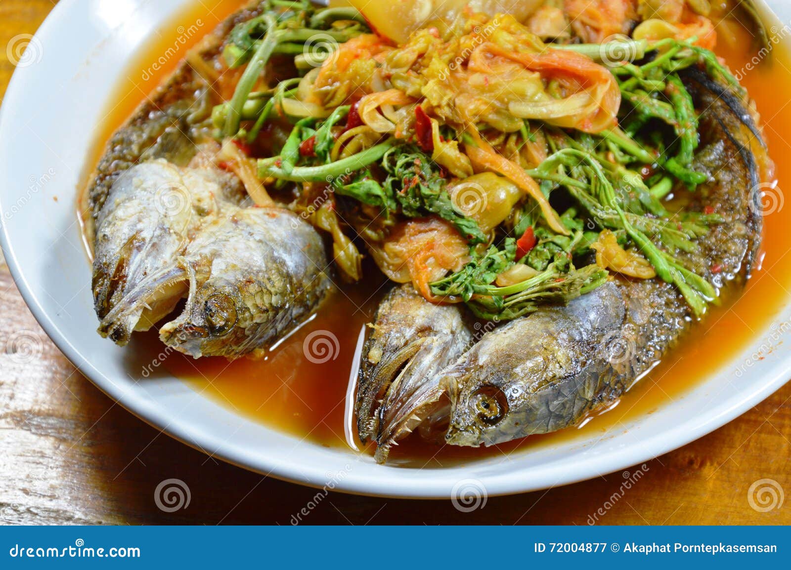 Deep Fried Striped Snake Head Fish in Mixed Hot and Sour Soup on Dish ...