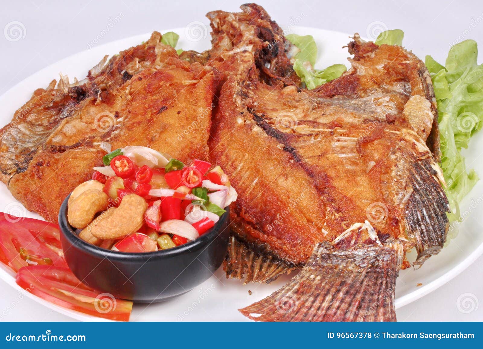 Deep Fried Tilapia with Spicy and Sour Herb Salad . Stock Photo - Image ...