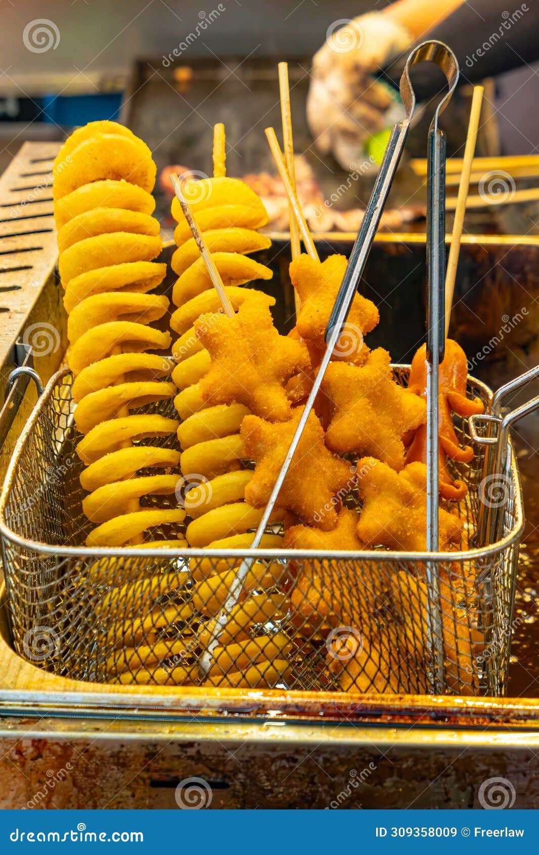 Deep Fried Tornado Potato and Other Food Stuffs Vertical Composition ...