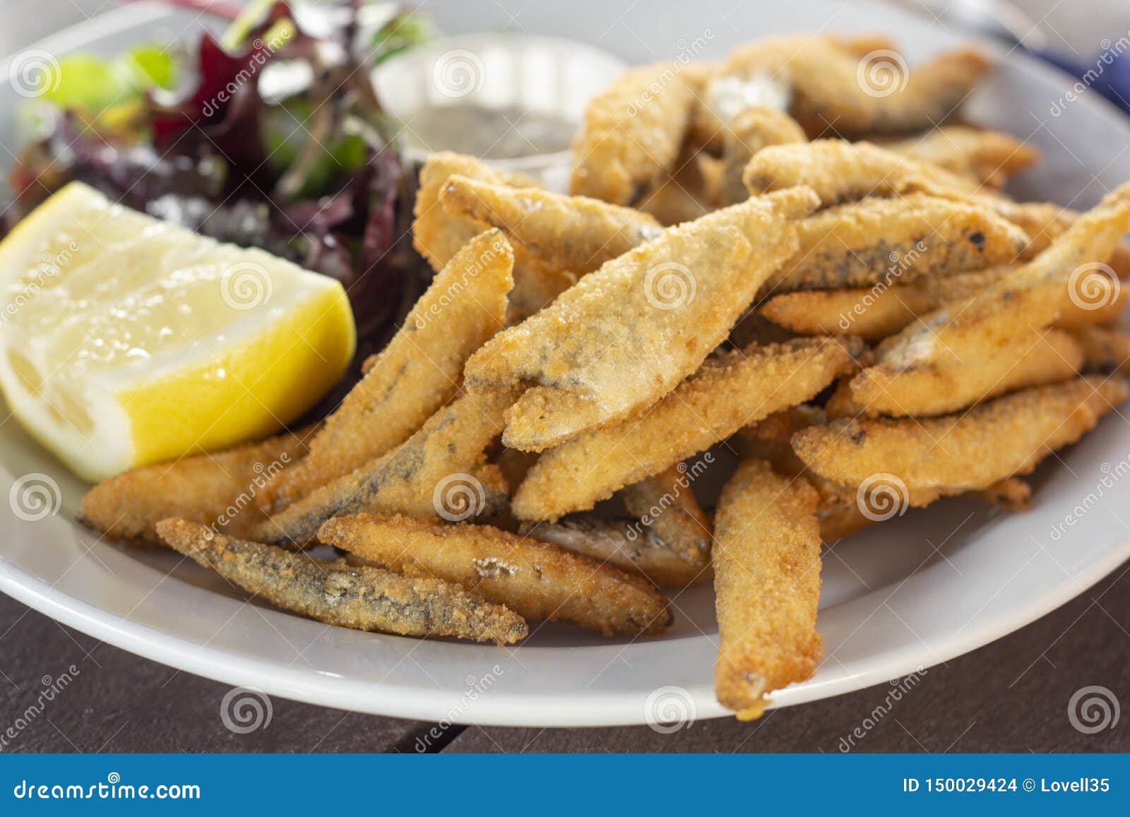 Deep fried white bait fish stock photo. Image of deep - 150029424