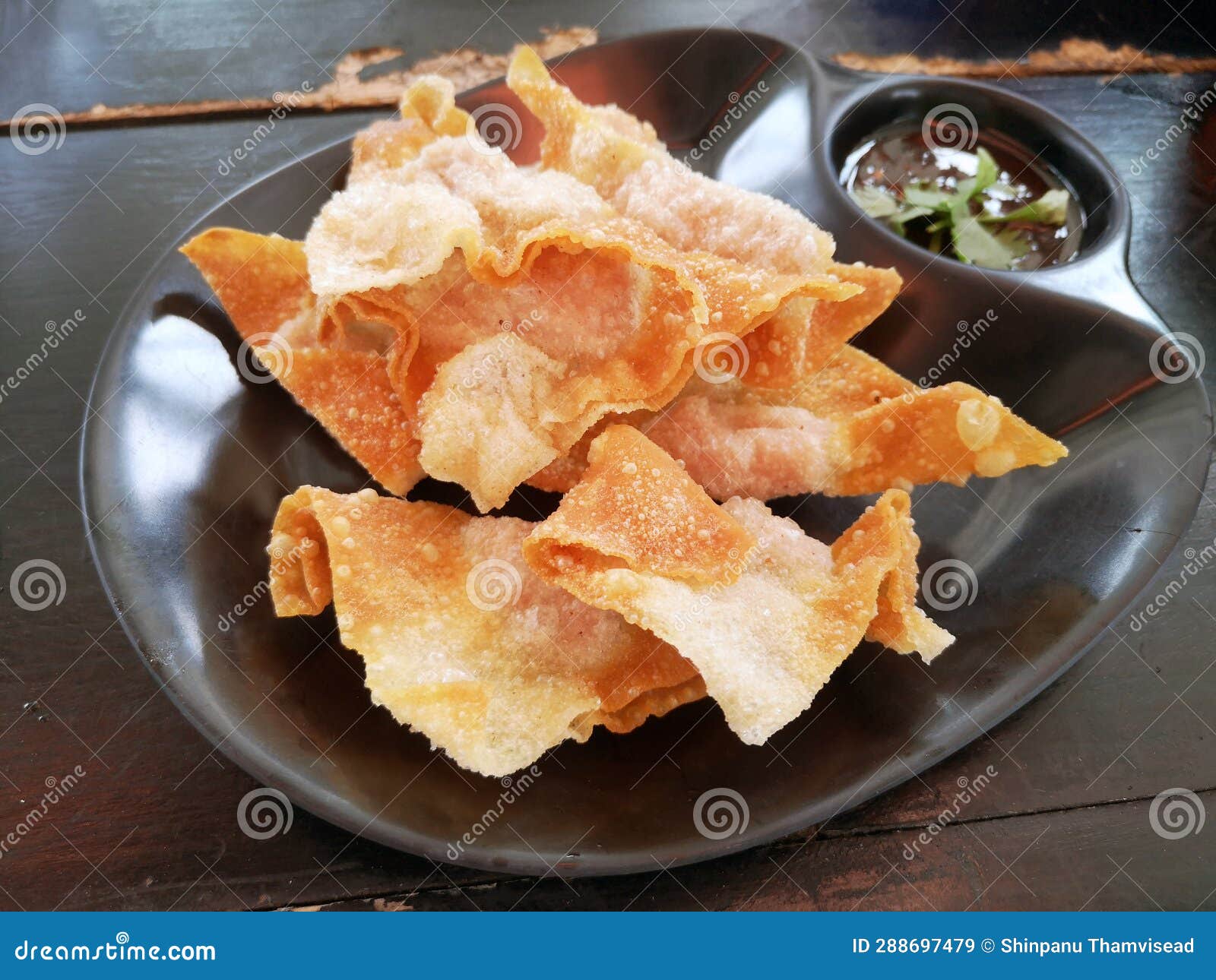 Deep Fried Wonton on Black Dish with Plum Sauce Stock Image - Image of ...