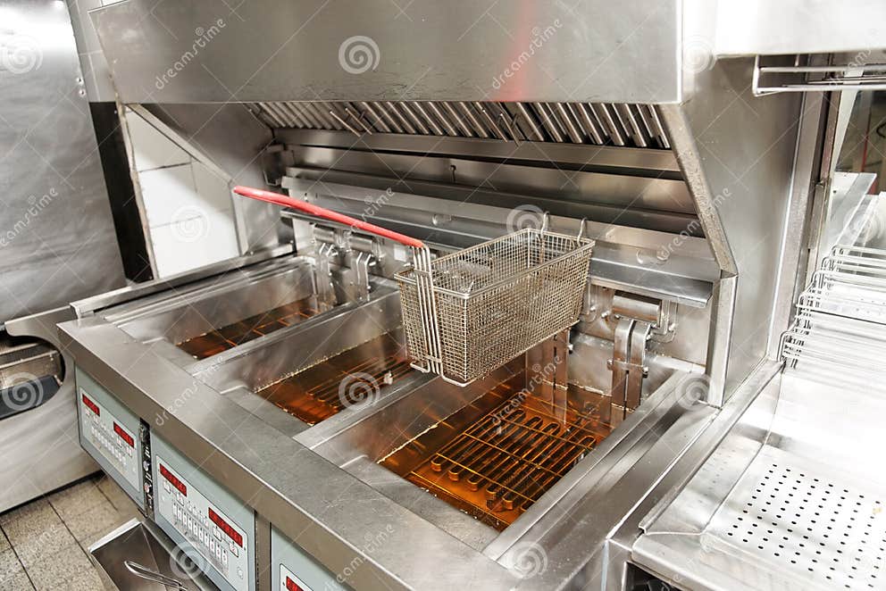 Deep fryer with oil stock image. Image of kitchen, food - 19942773