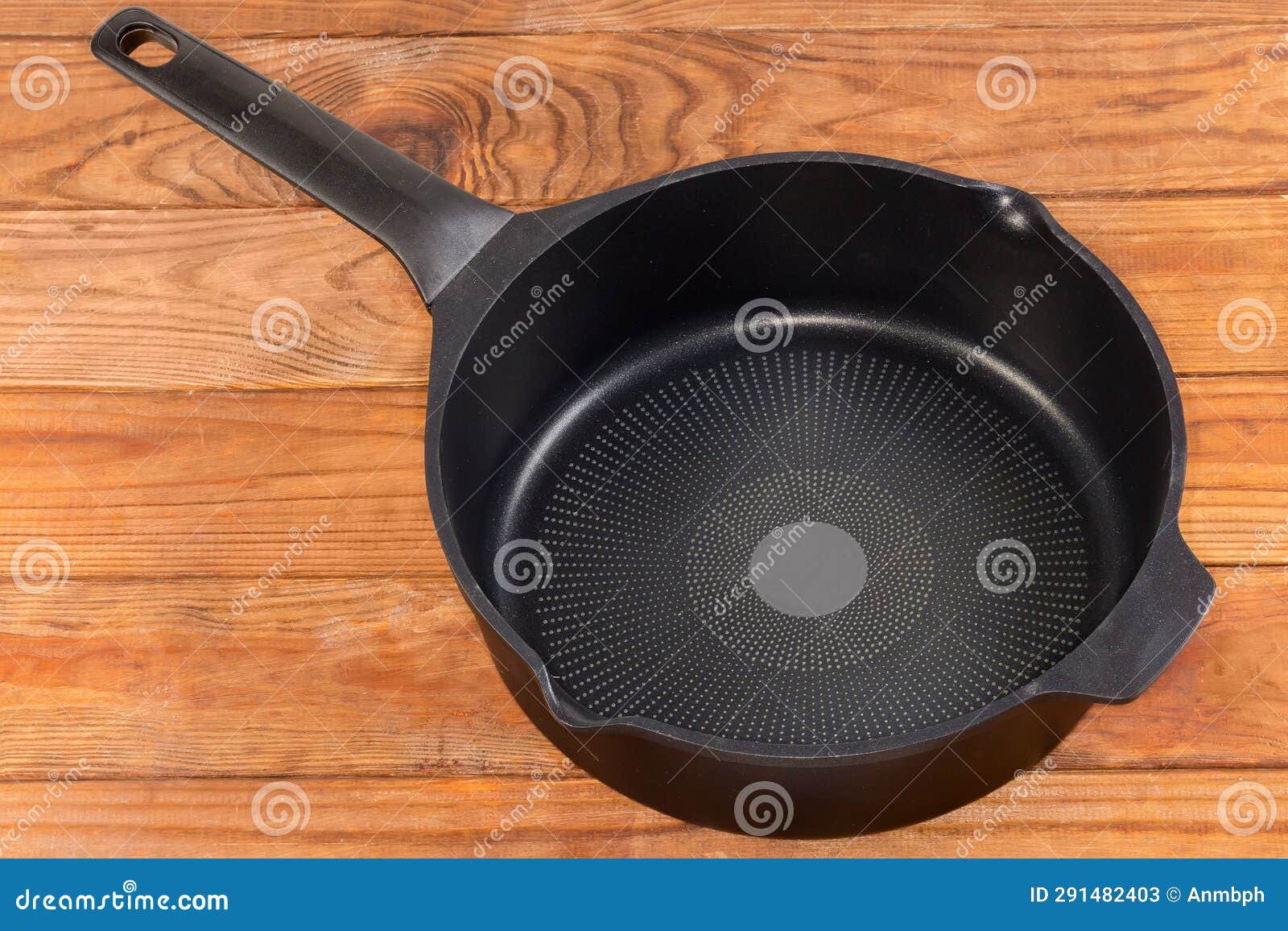 Deep Frying Pan with Non-stick Coating on Rustic Table Stock Image ...