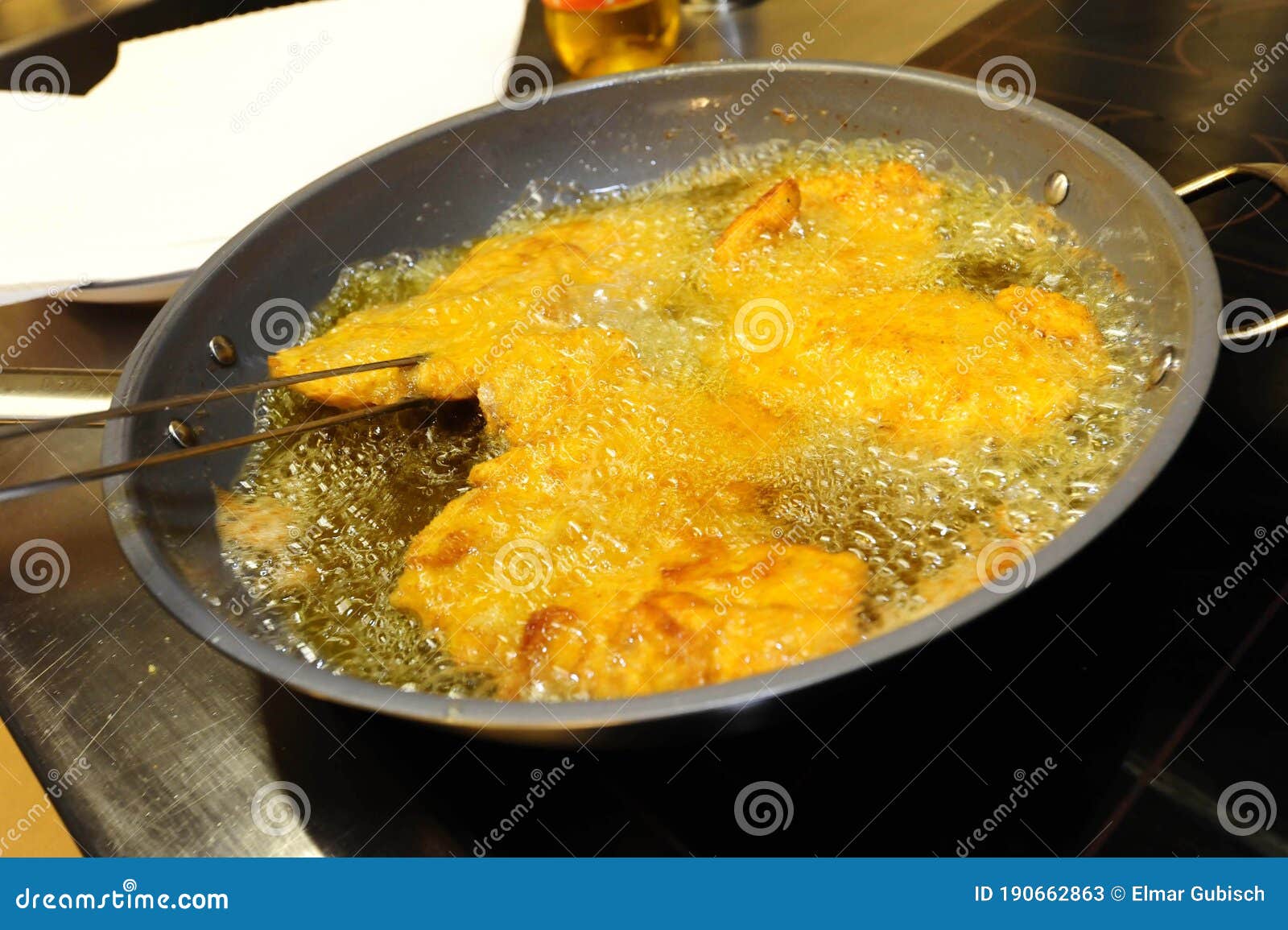 Deep Frying a Wiener Schnitzel Stock Image - Image of chain, gourmet ...