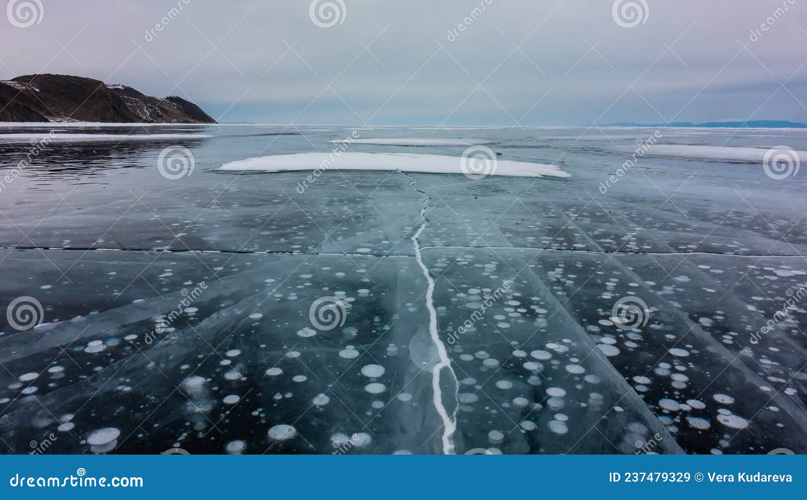 Deep Intersecting Cracks, Bubbles of Frozen Methane Gas are Visible on ...