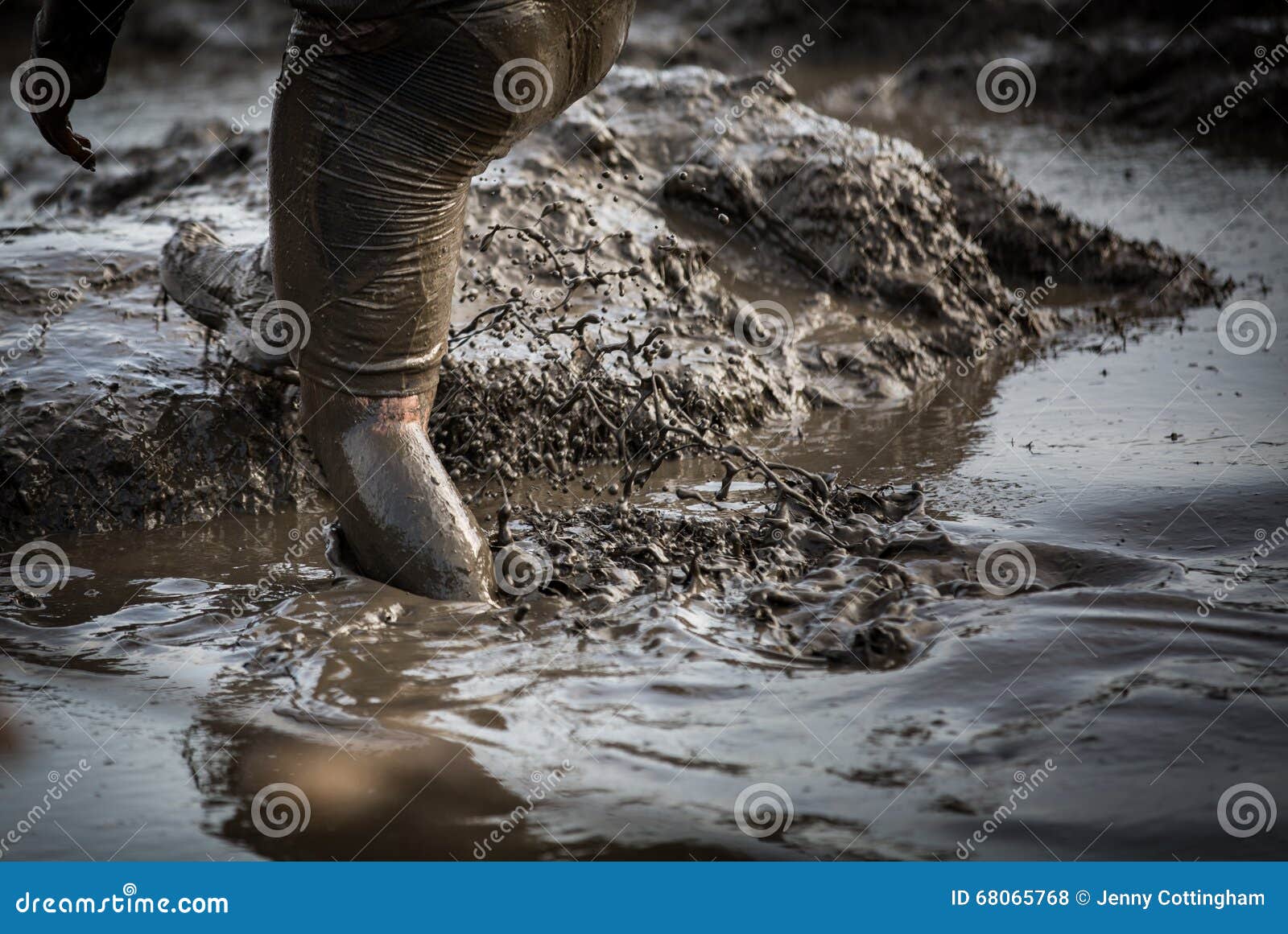 Deep Muddy Water with Feet Splashing and Climbing Out of the Mud Stock ...