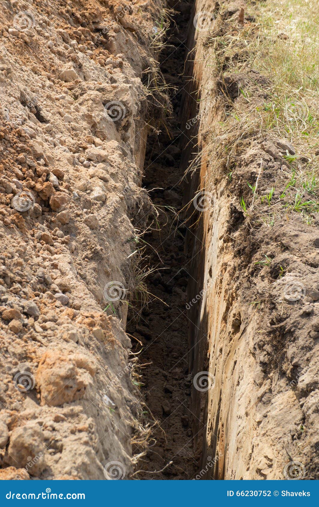 Deep narrow ditch in land stock photo. Image of earth - 66230752