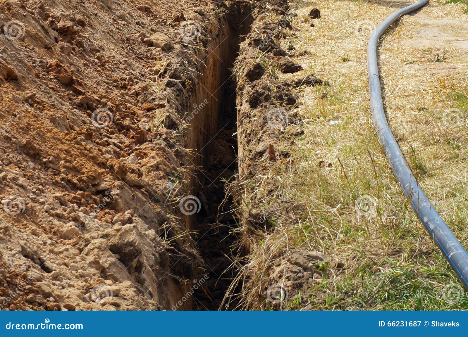 Deep Narrow Ditch for Water Pipe Stock Image - Image of brown, vertical ...